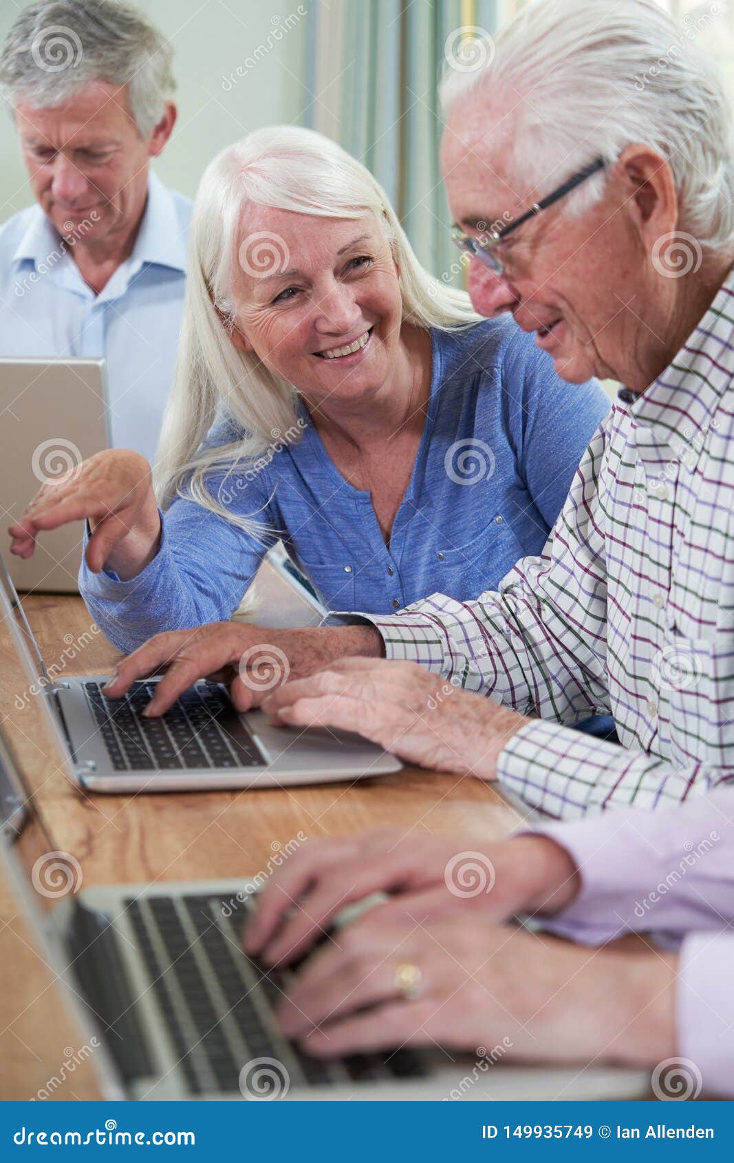 Tutor Helping Senior Man in Computer Class Stock Image - Image of ...