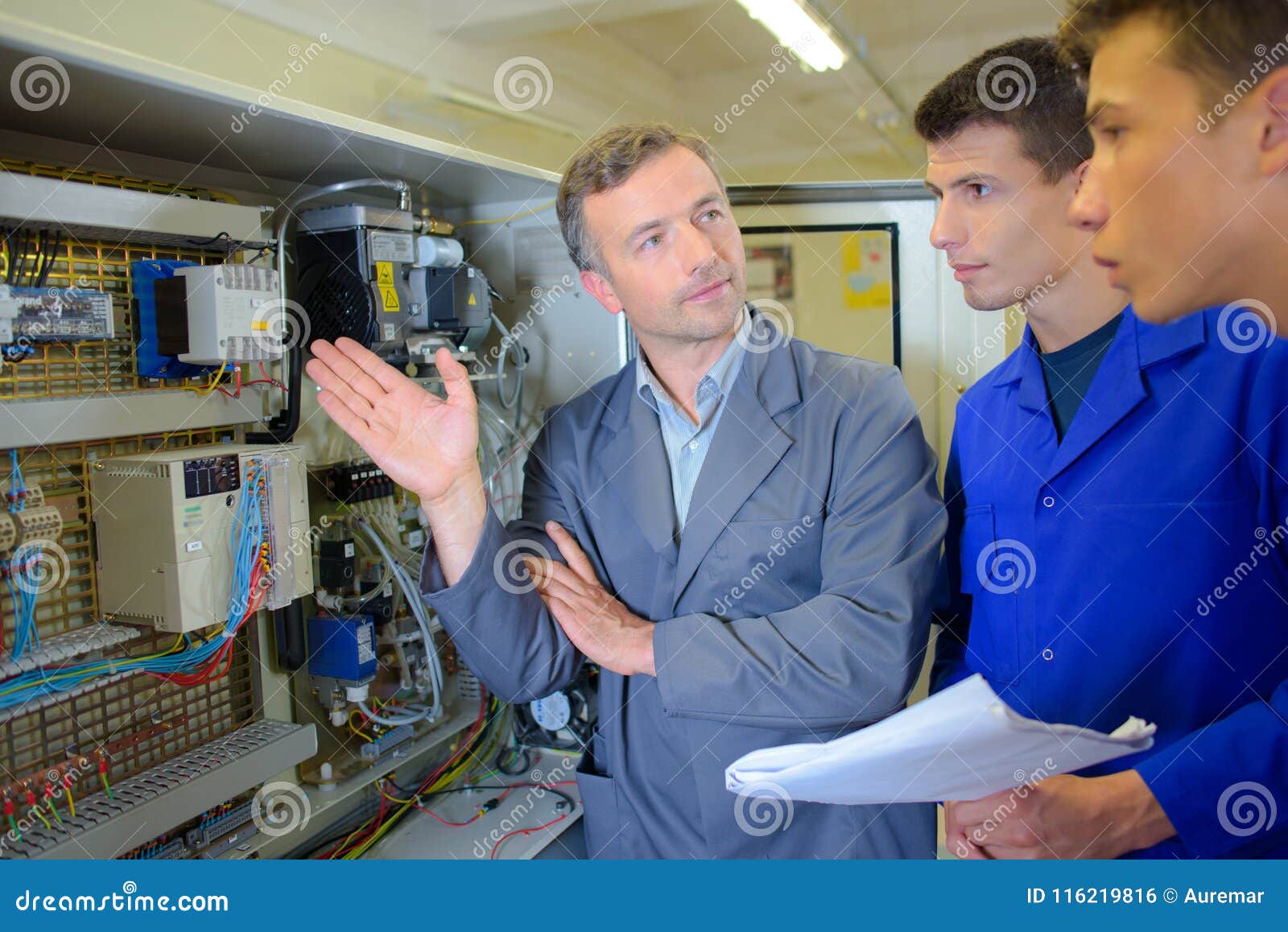 Tutor Showing Electric Circuit To Trainees Stock Photo - Image of ...