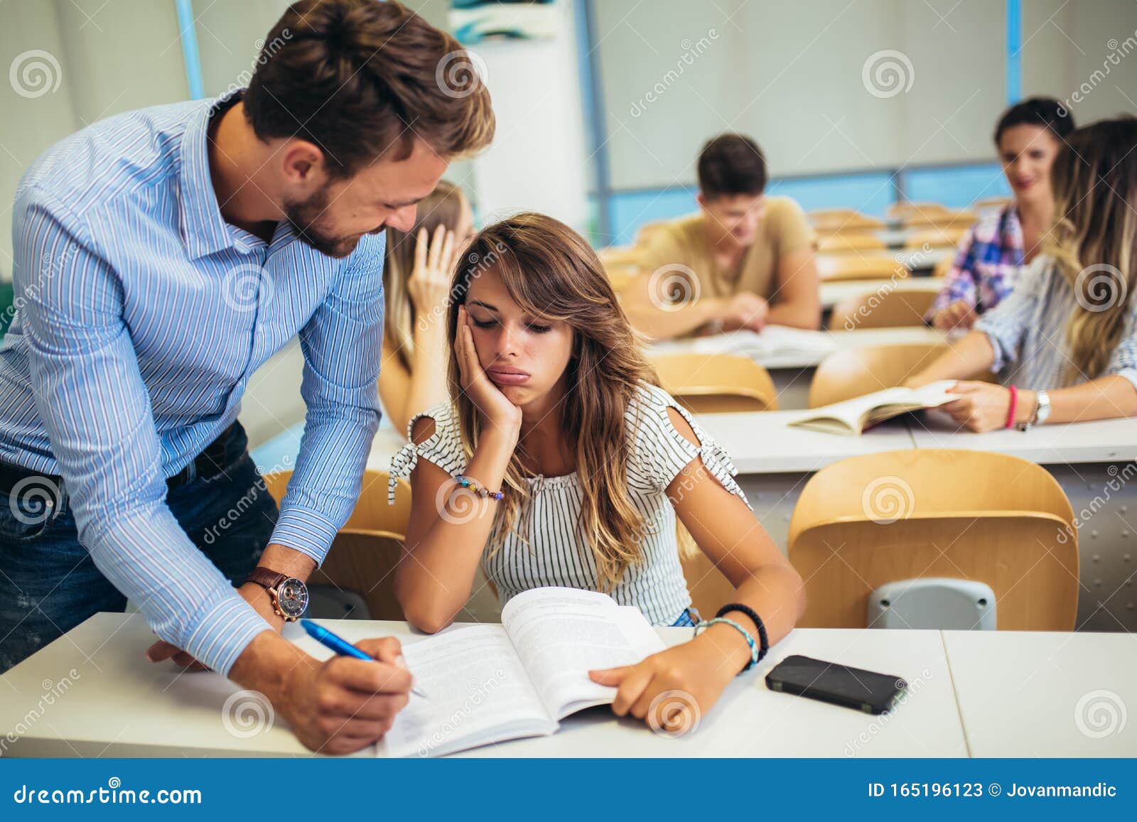Tutor Teaching University Students in Classroom Stock Image - Image of ...