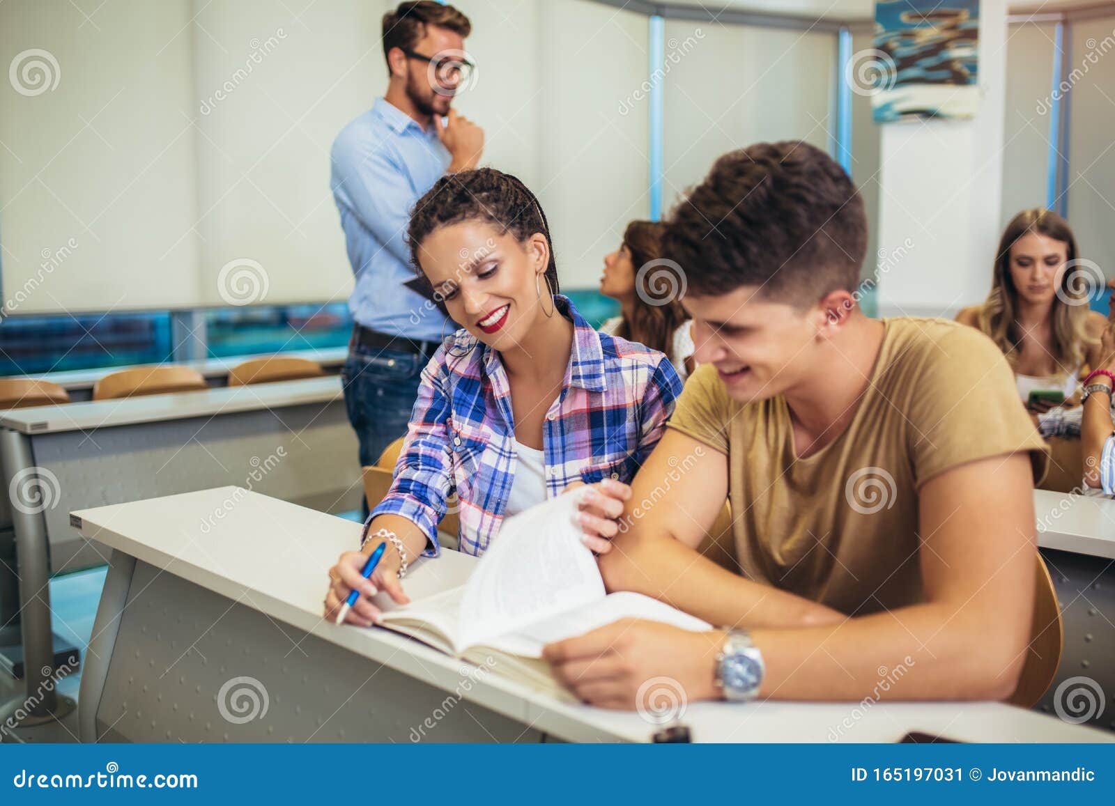 Tutor Teaching University Students in Classroom Stock Image - Image of ...