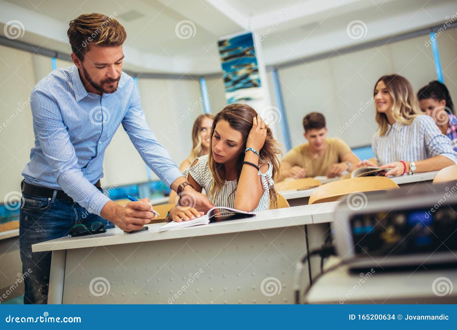 Tutor Teaching University Students in Classroom Stock Photo - Image of ...