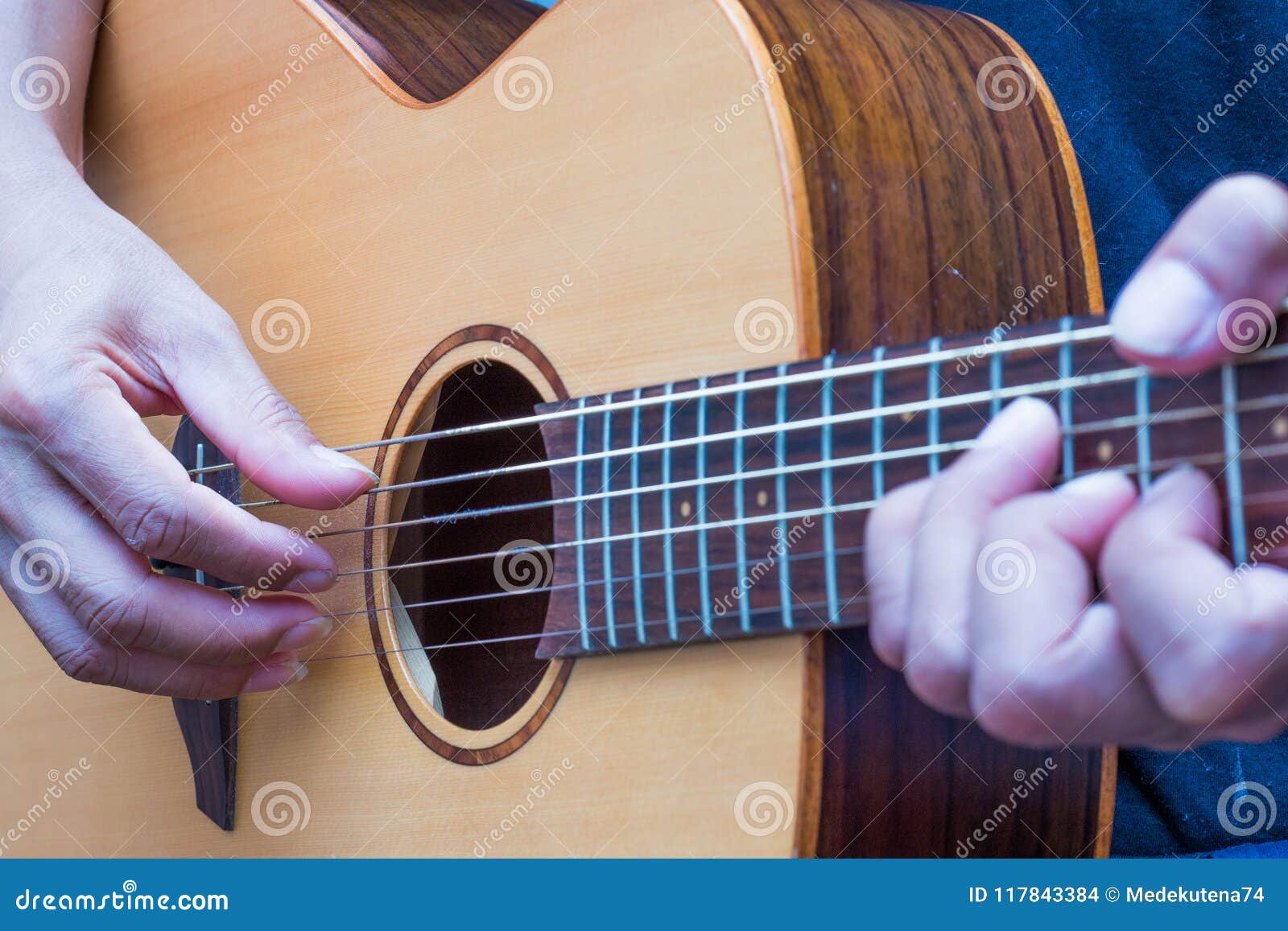 Tutorial To Playing Acoustic Guitar Stock Photo - Image of close ...