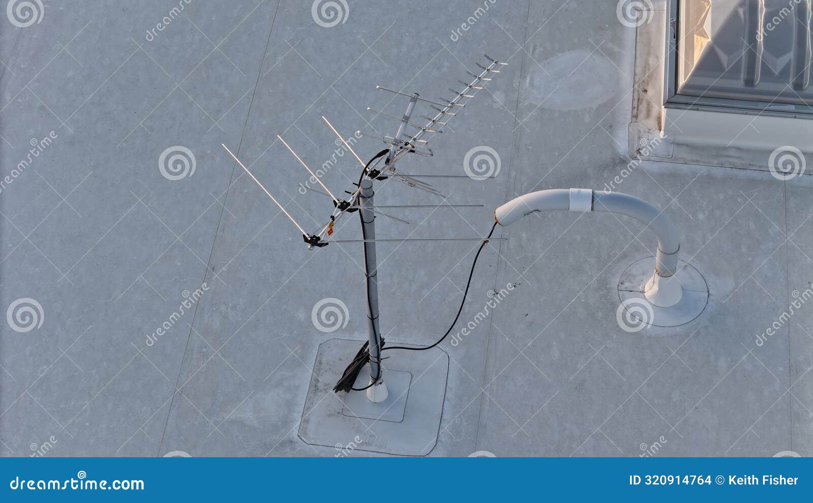 TV Antenna Rooftop Install with Cable Going into PVC Pipe Stock Photo ...
