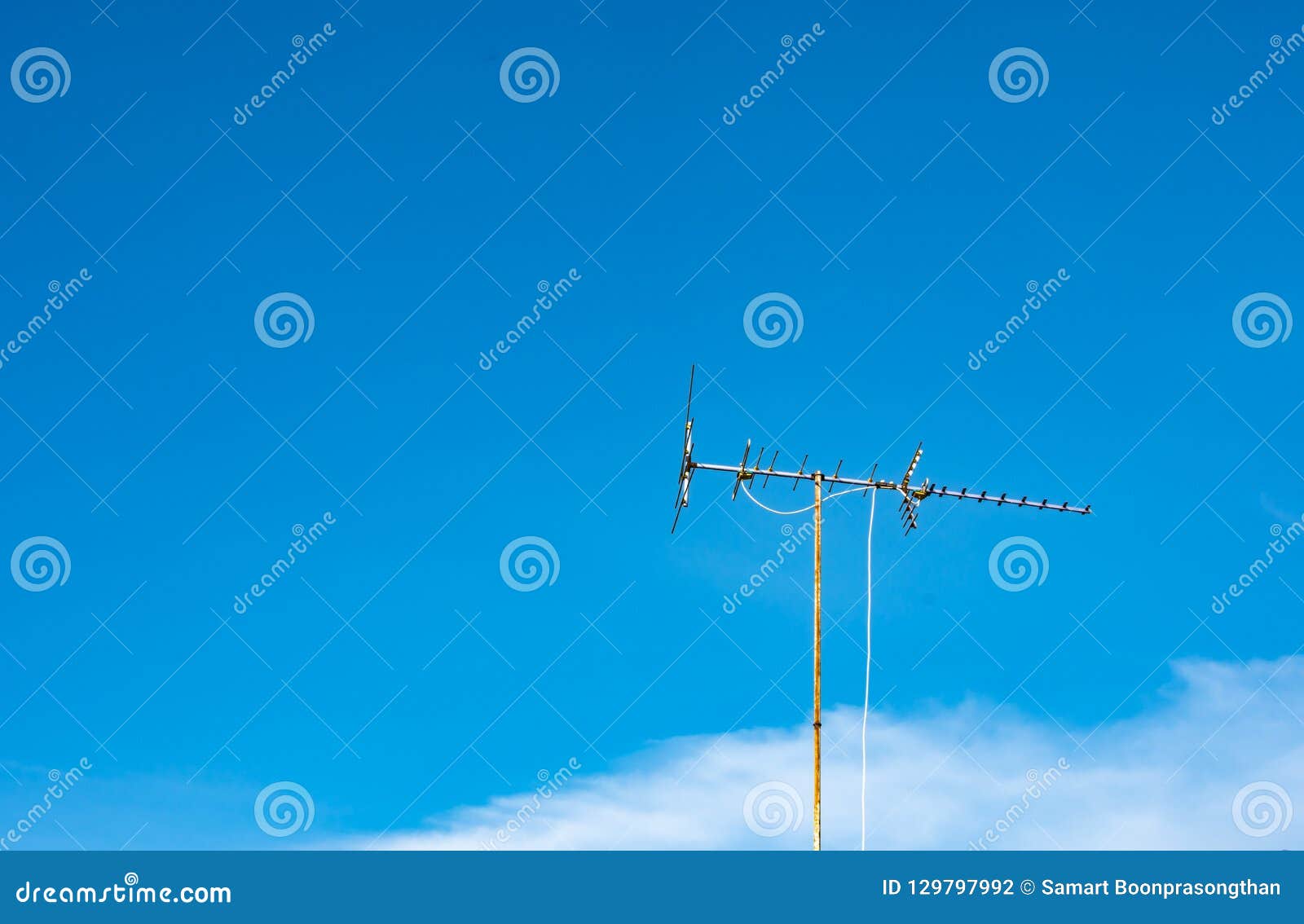 Tv antenna and the sky. stock photo. Image of blue, outdoor - 129797992