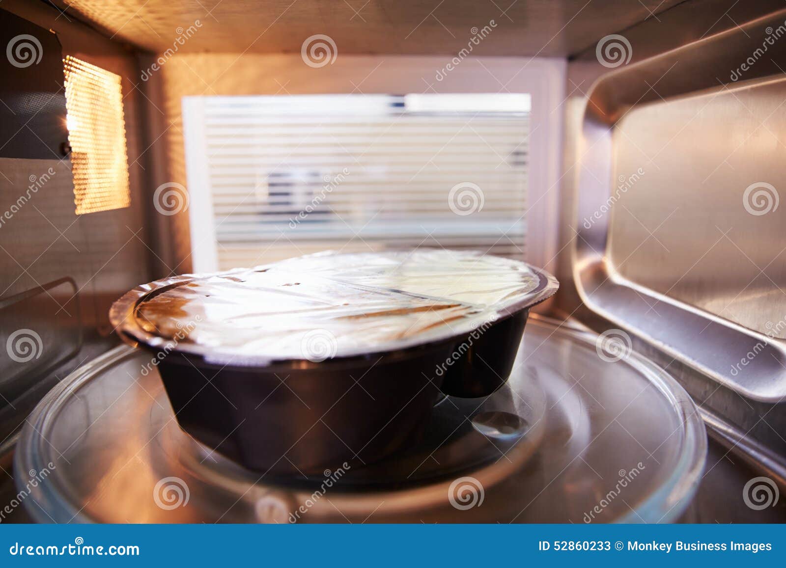 TV Dinner Cooking Inside Microwave Oven Stock Image - Image of home ...