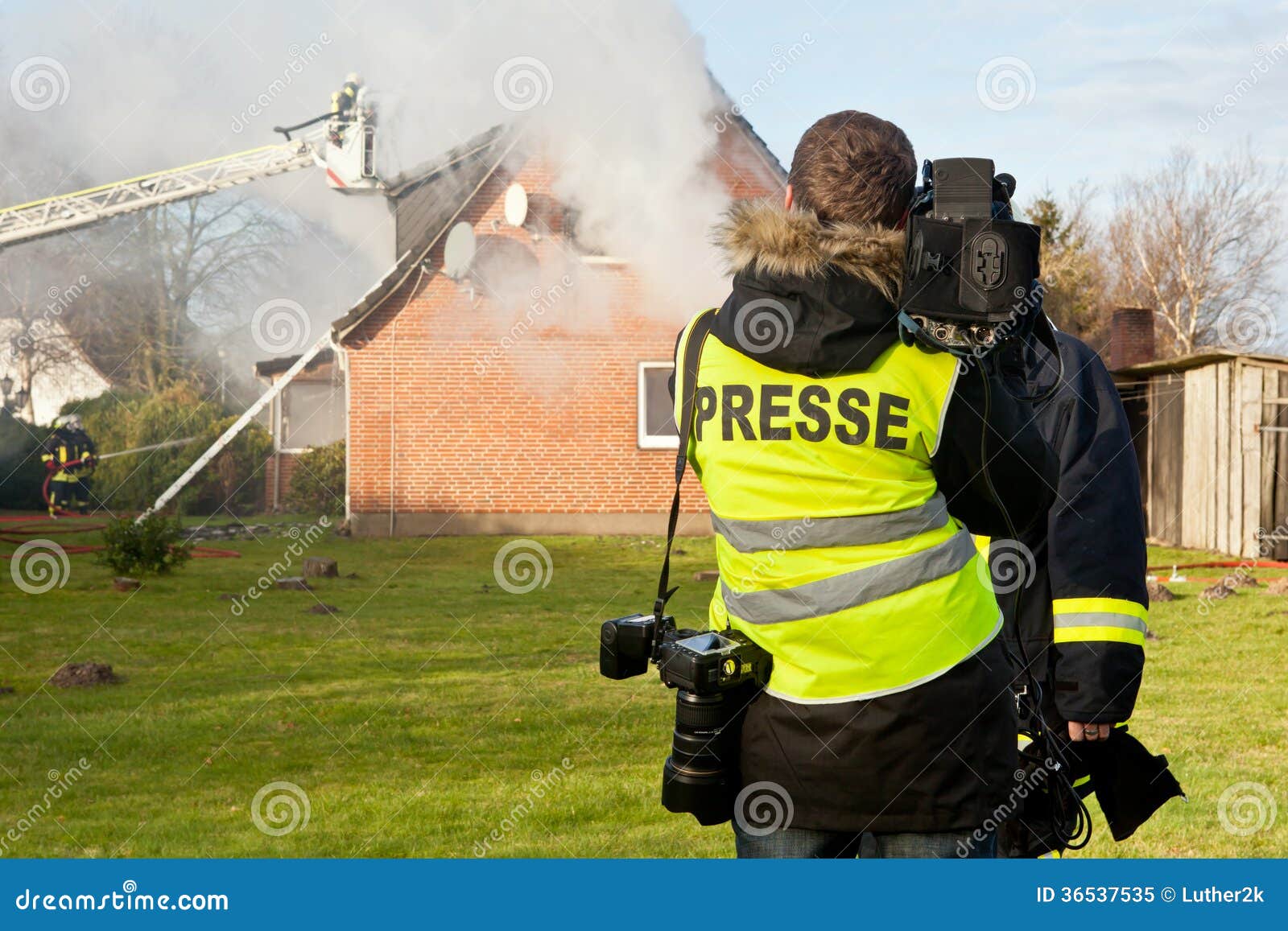 TV interview at house fire stock image. Image of journalist - 36537535