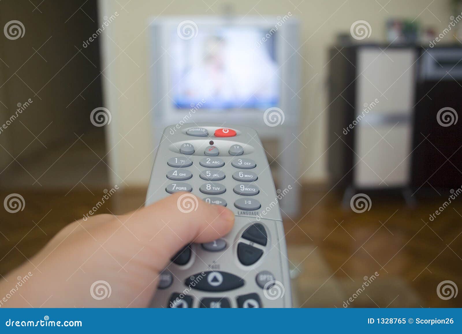 TV remote control stock image. Image of television, hands - 1328765