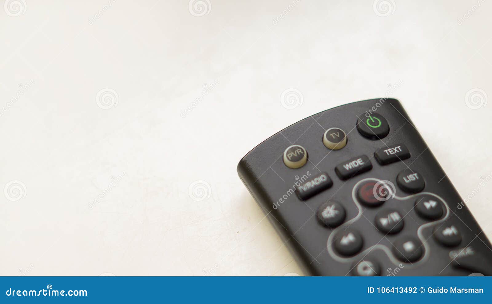 TV Remote Control with Focus on and Off Button on a White Background ...