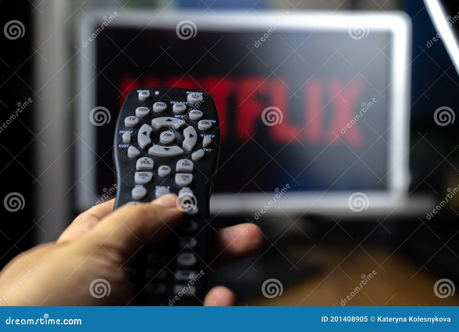 Tv Remote Control in Front of Tv Screen with Netflix Logo Editorial ...