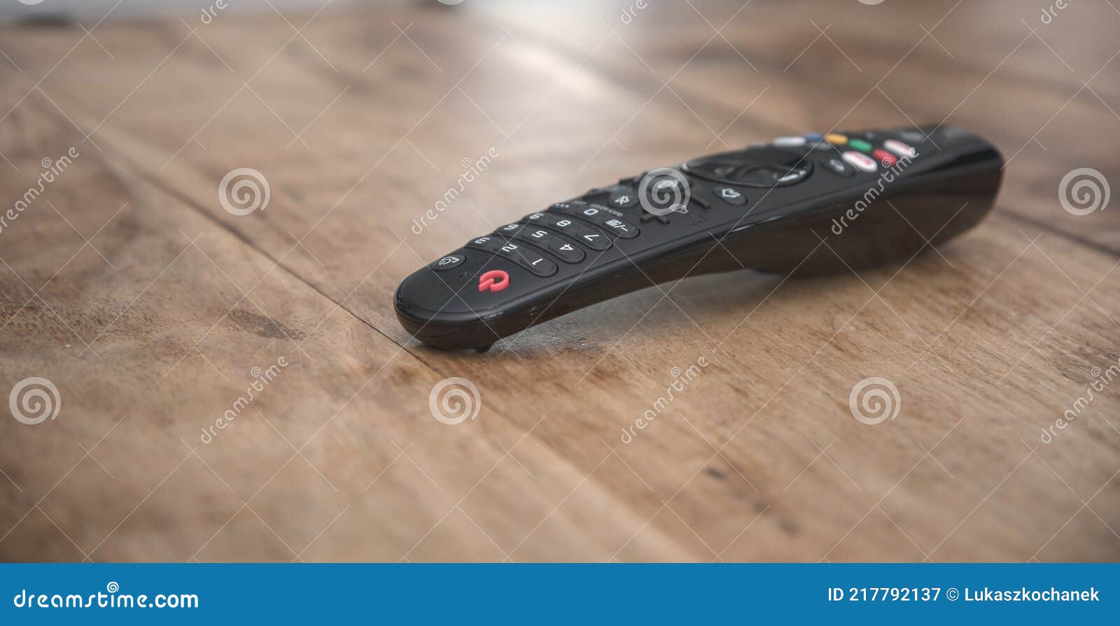 TV Remote Control on Wooden Table Stock Image - Image of eating ...