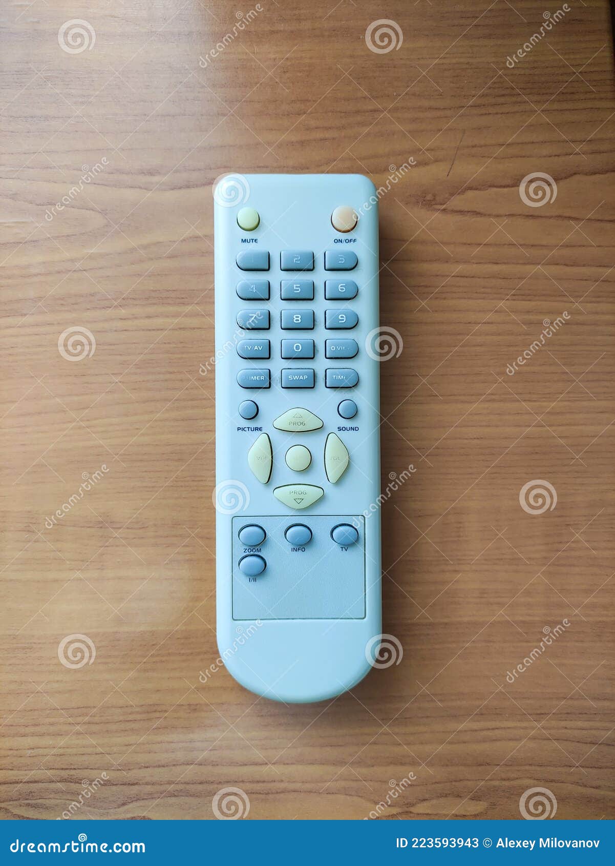 TV Remote Control on Wooden Table, Vertical Photo Stock Image - Image ...