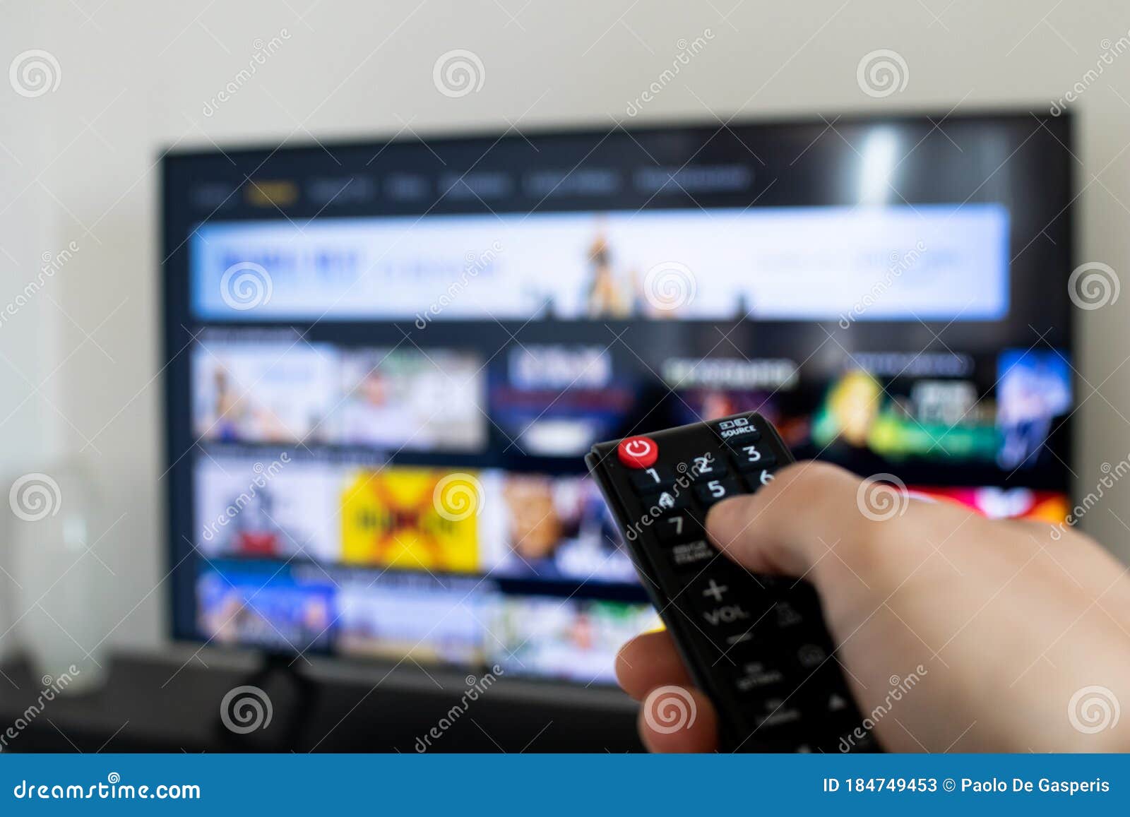 Tv Remote Controller in Hand of Customer Looking for Some Content in ...