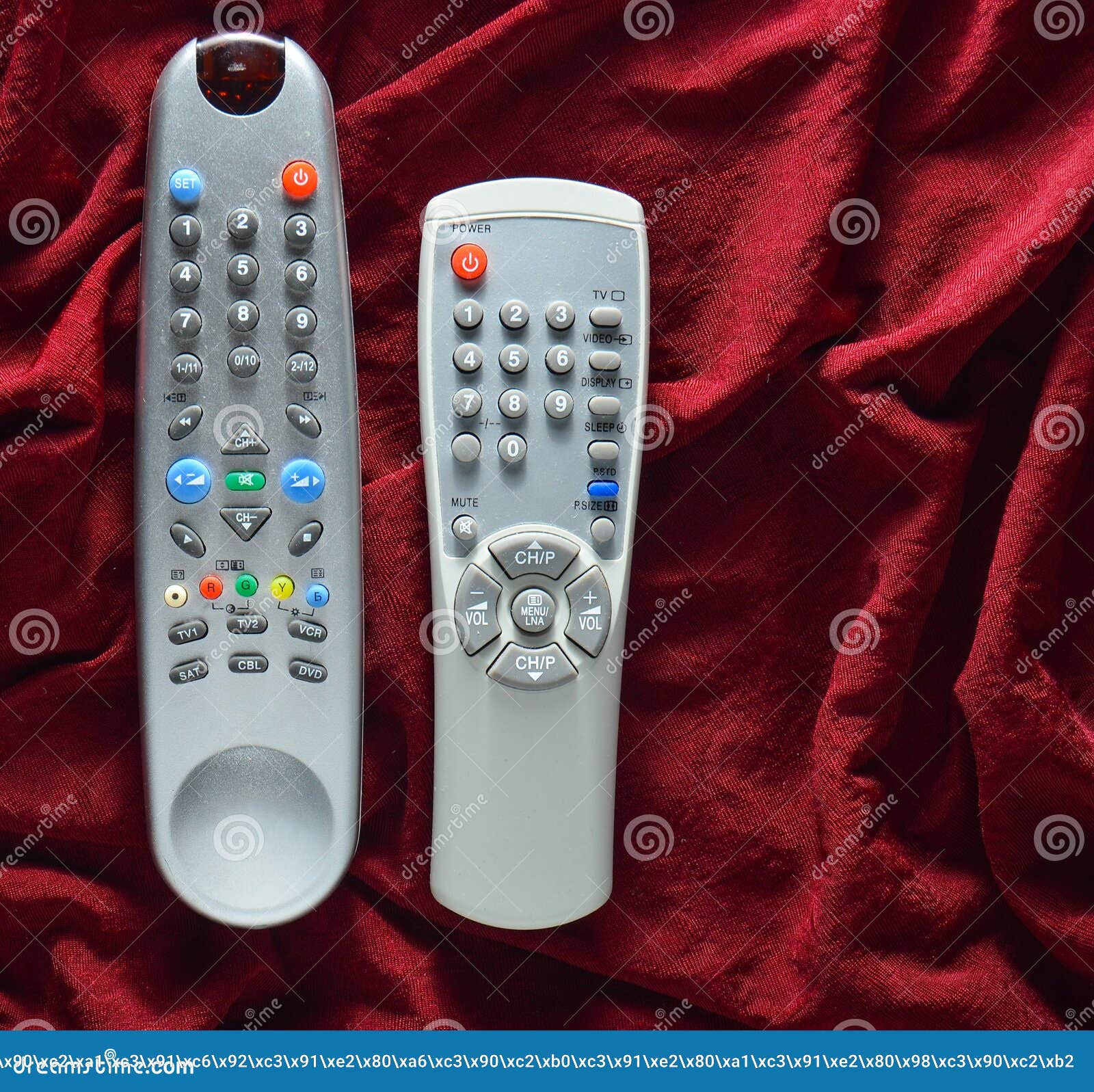 TV Remote Controls on a Red Silk Background. Stock Image - Image of ...