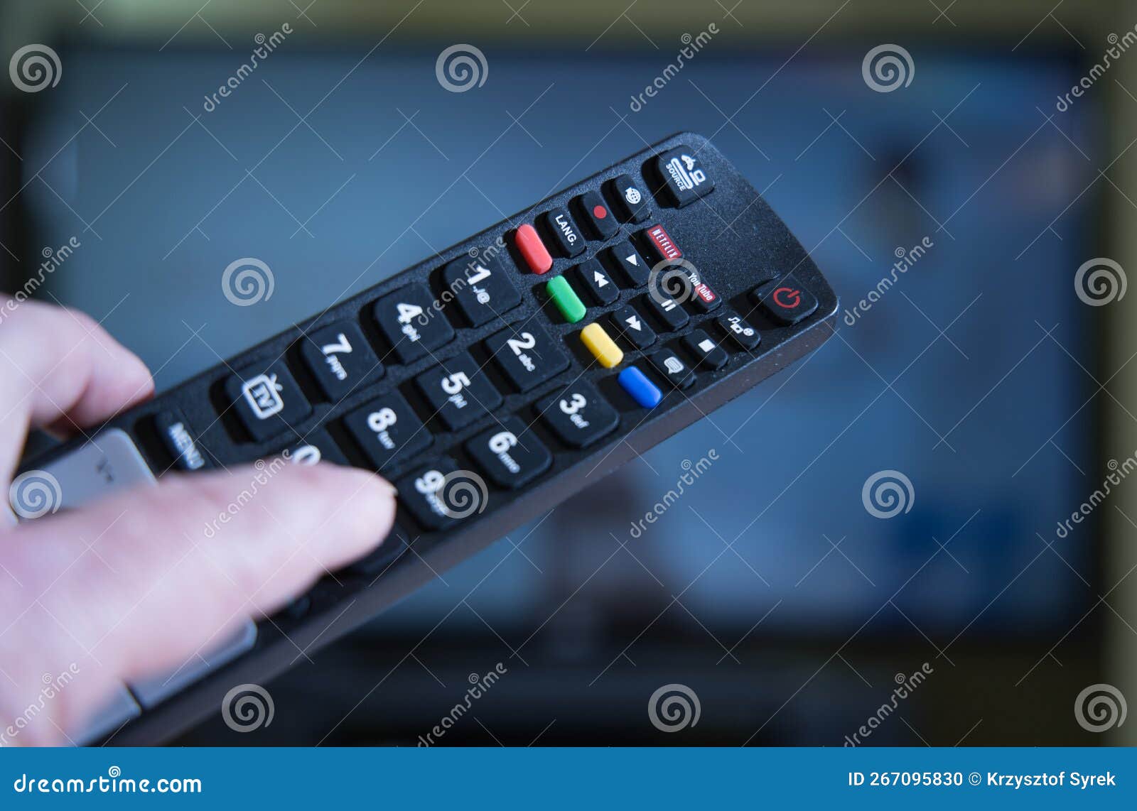 TV Remote in Use and Held by a Person Stock Photo - Image of television ...