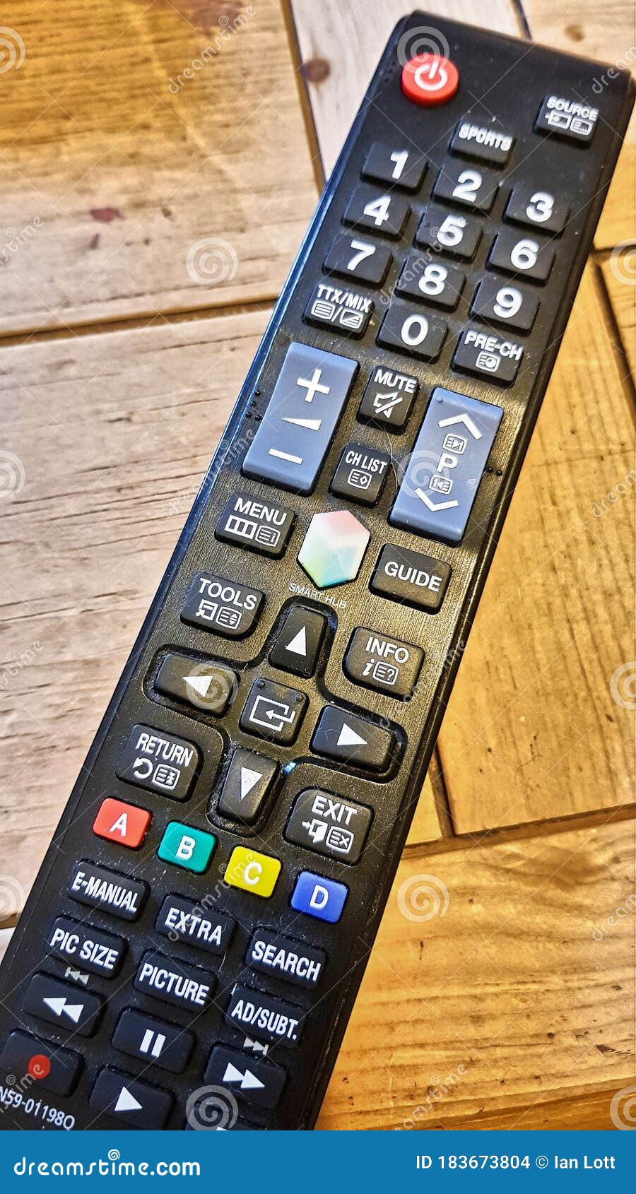 TV Remote on a Wooden Table Stock Photo - Image of remote, wooden ...