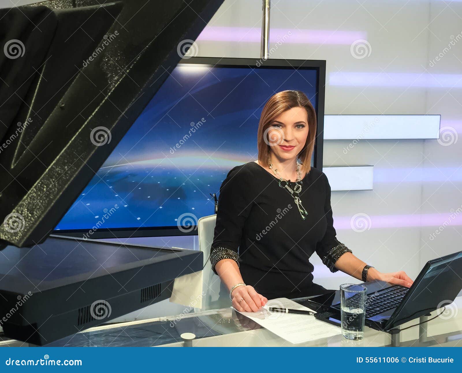 TV Reporter at the News Desk Stock Photo - Image of news, read: 55611006