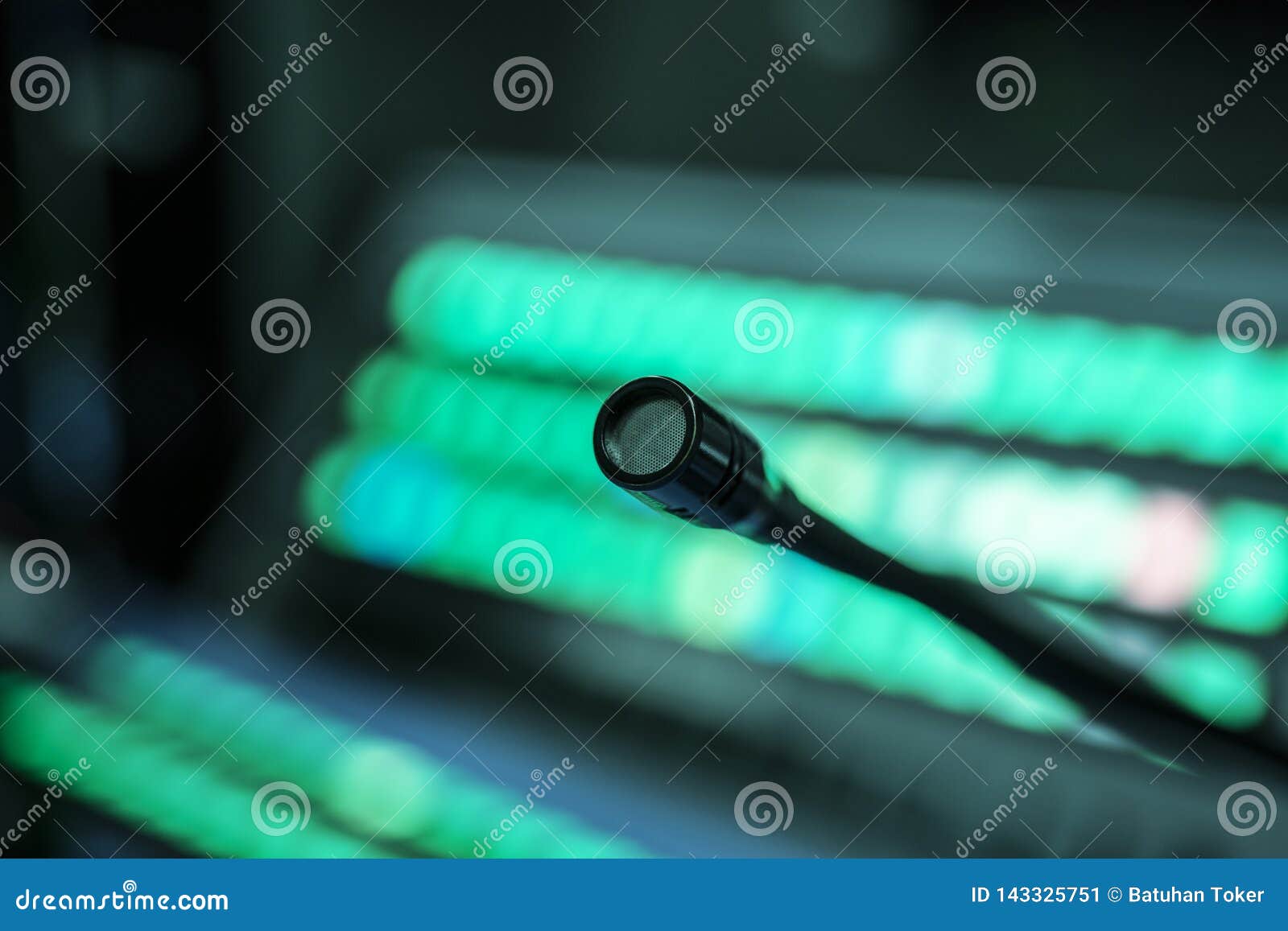 TV Studio Microphone. Remote Control TV with a Microphone a Bit Blurred ...