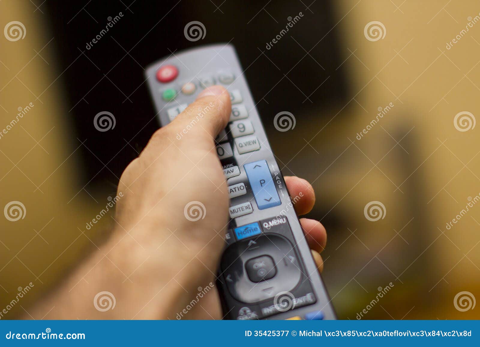 TV/Video Control in arm stock image. Image of indoor - 35425377