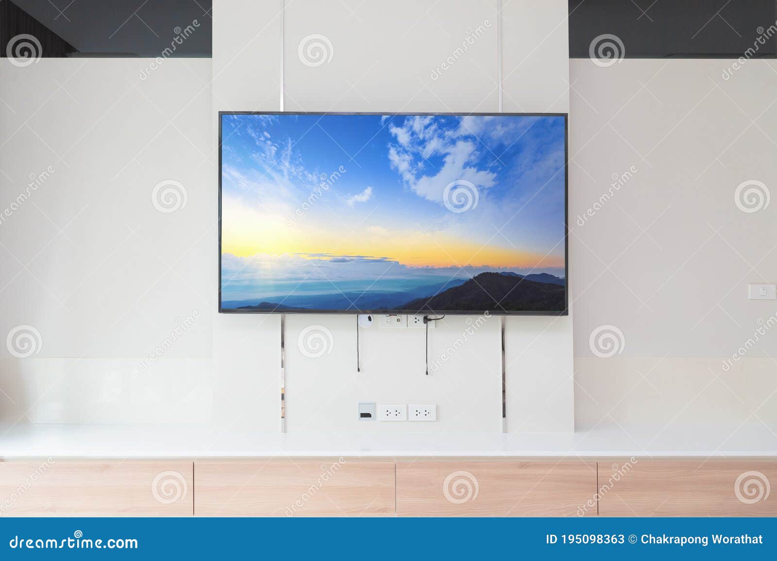 TV on the Wall in Modern Living Room. Landscape on Screen Stock Image ...