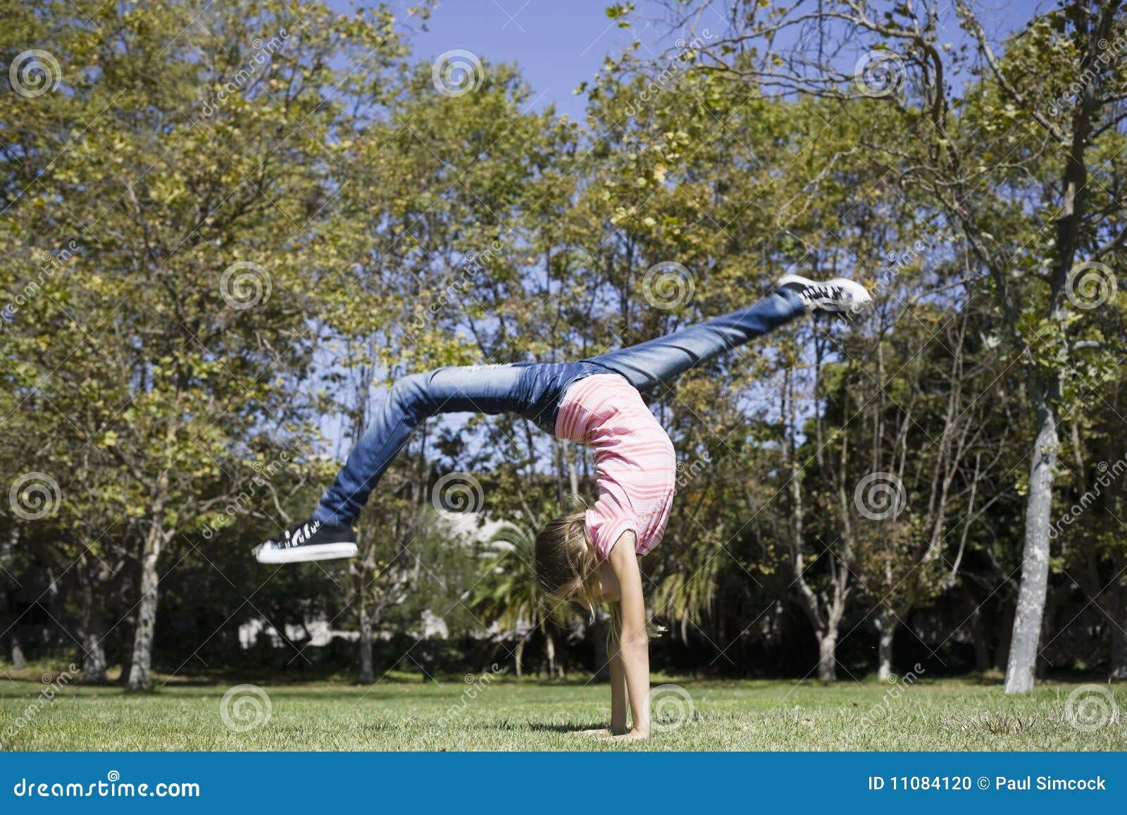 Tween Girl Doing Gymnastics Stock Photo - Image of outside, daytime ...