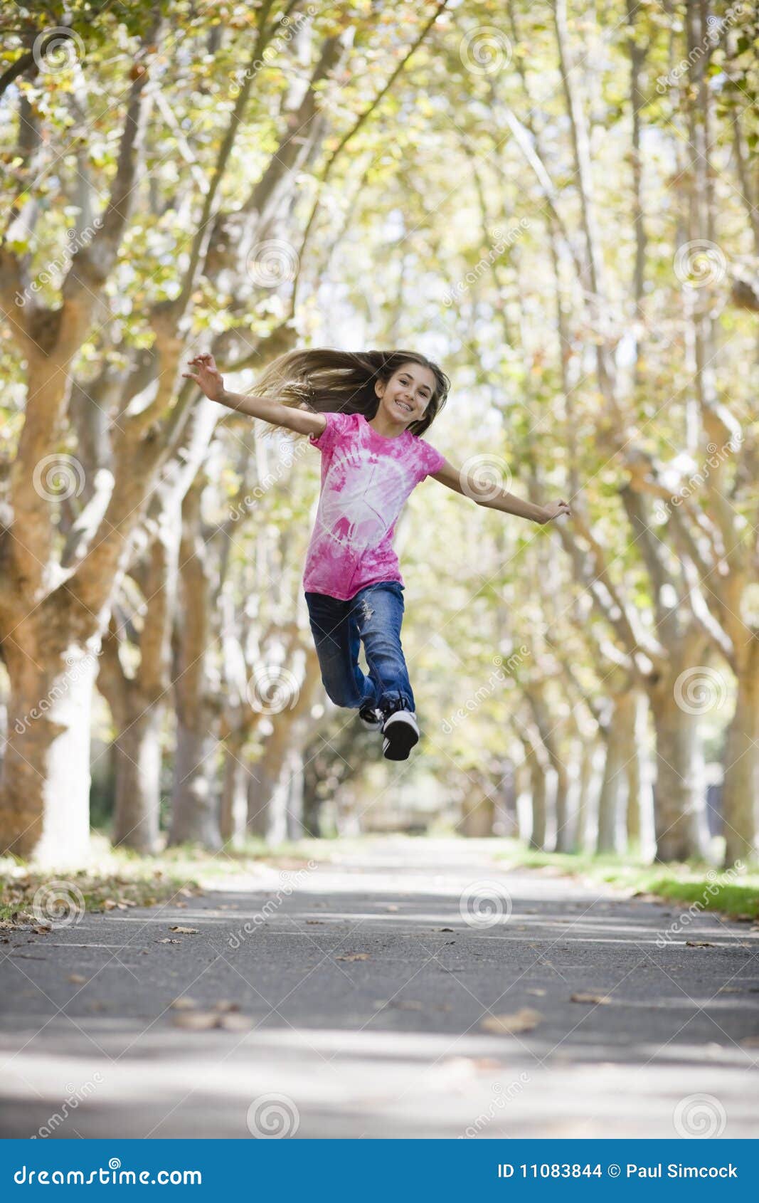 Tween Girl Jumping stock photo. Image of childhood, girl - 11083844