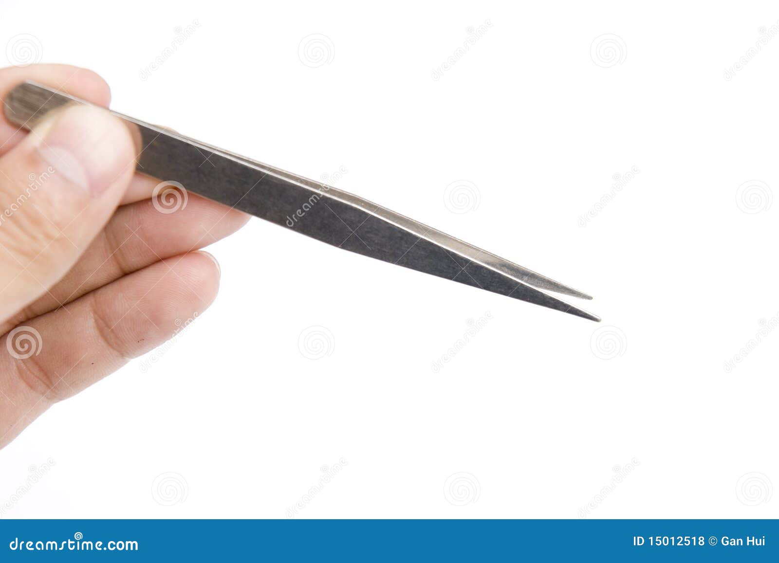 Tweezers in a hand stock photo. Image of accessories - 15012518
