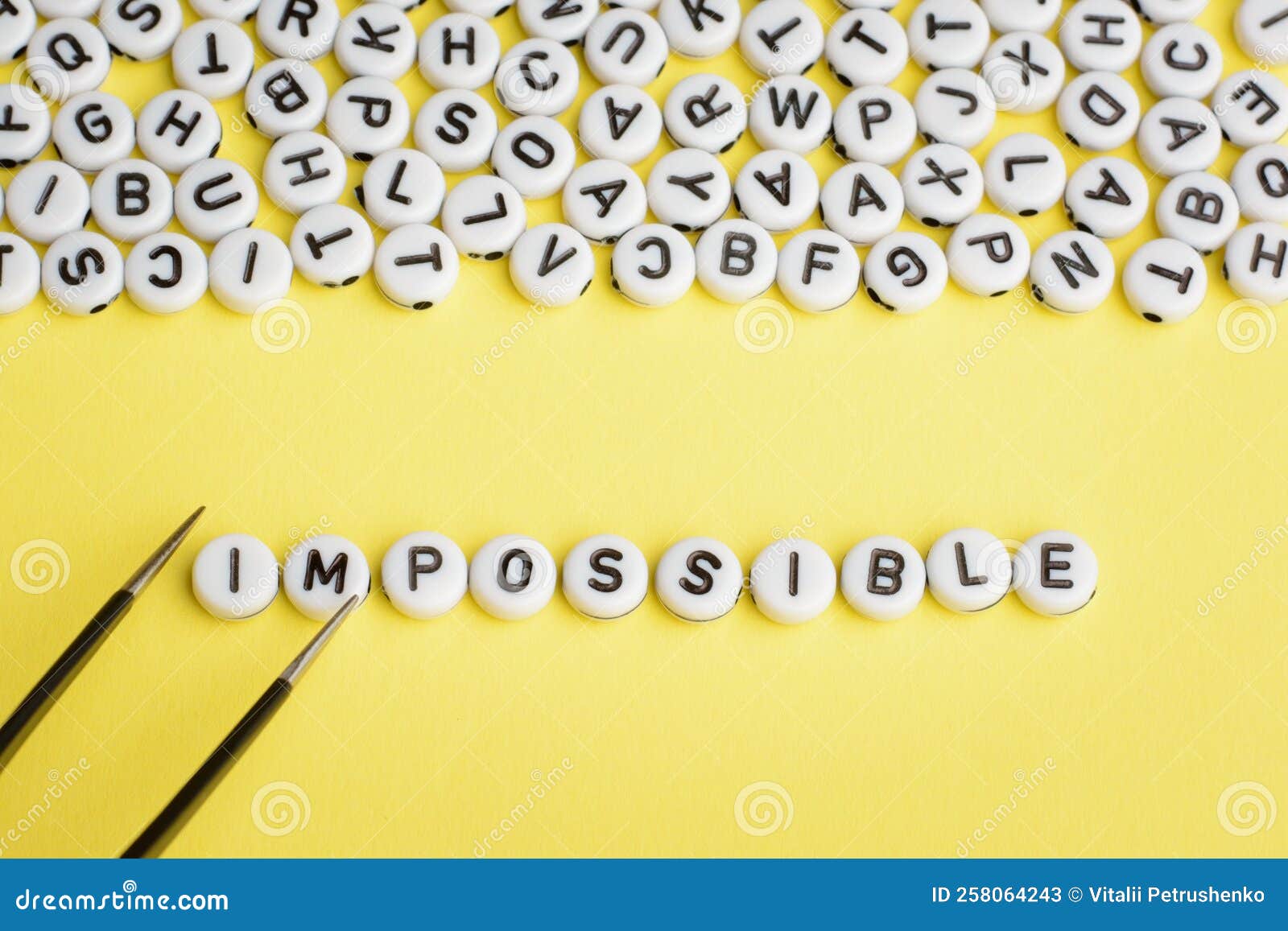 IMPOSSIBLE Word Made by White Plastic Blocks on a Yellow Background ...