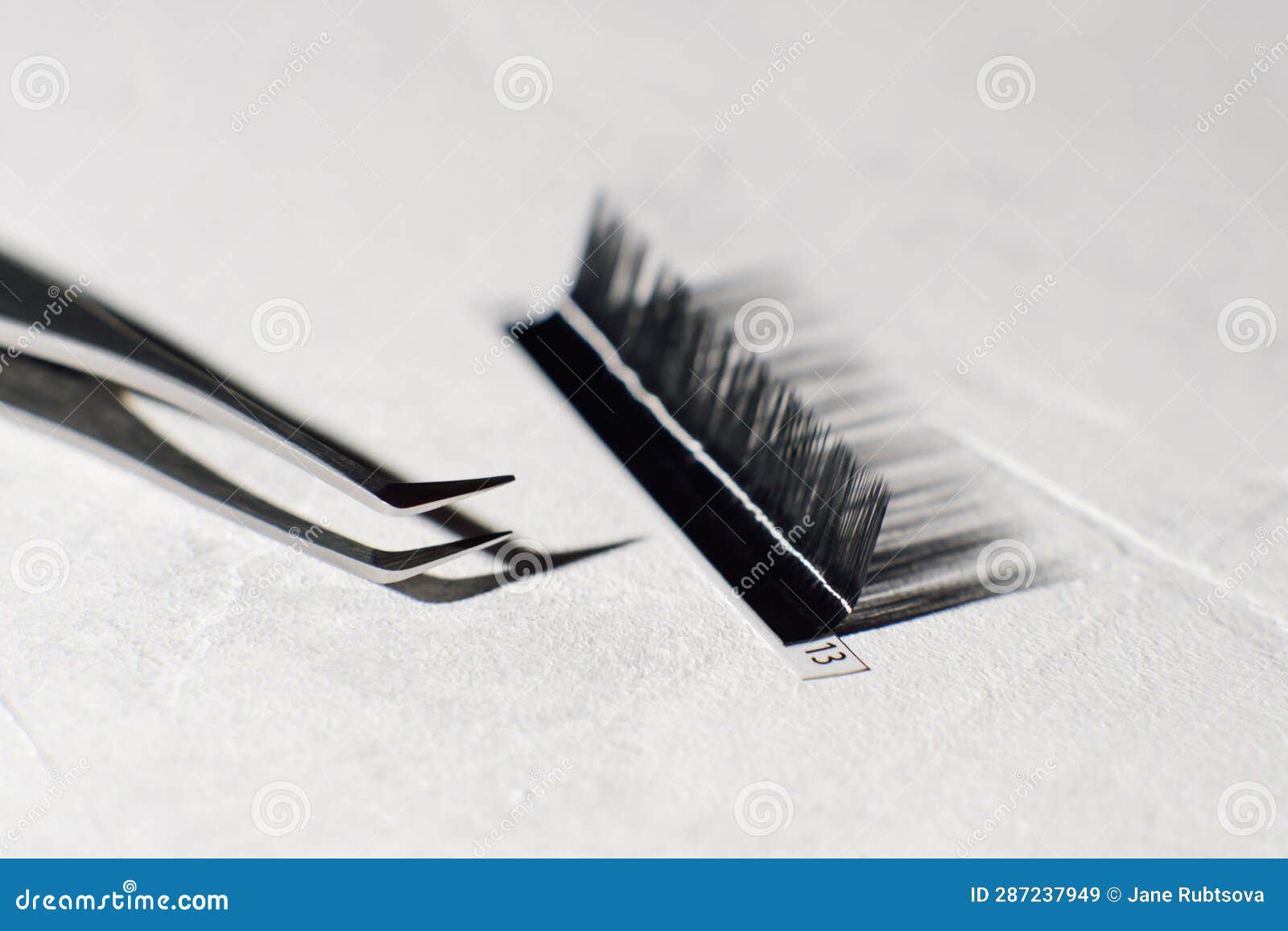 Tweezers, Using for Isolating Lashes, Lying Near Palette of Artificial ...