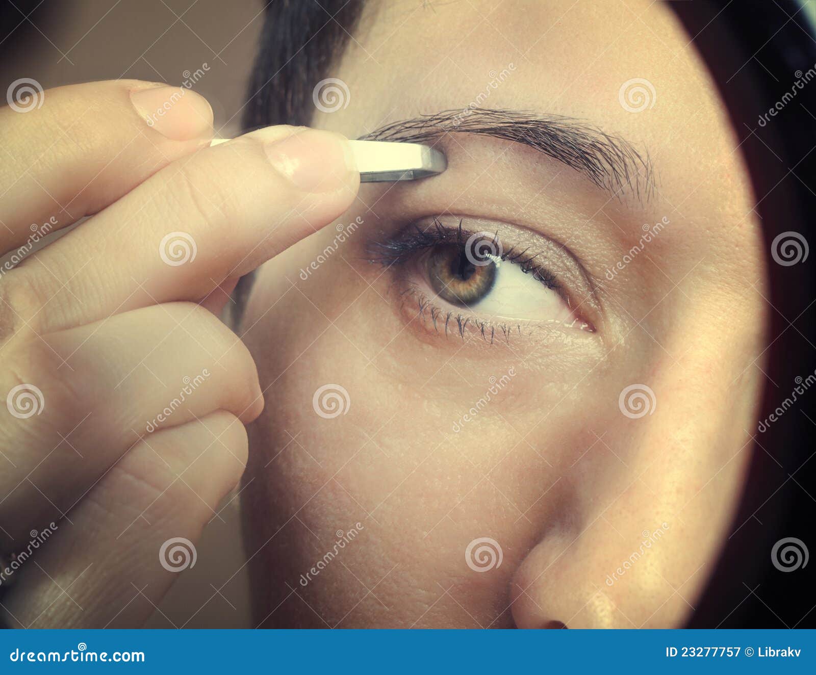 Tweezing eyebrows stock image. Image of pulling, tweeze - 23277757