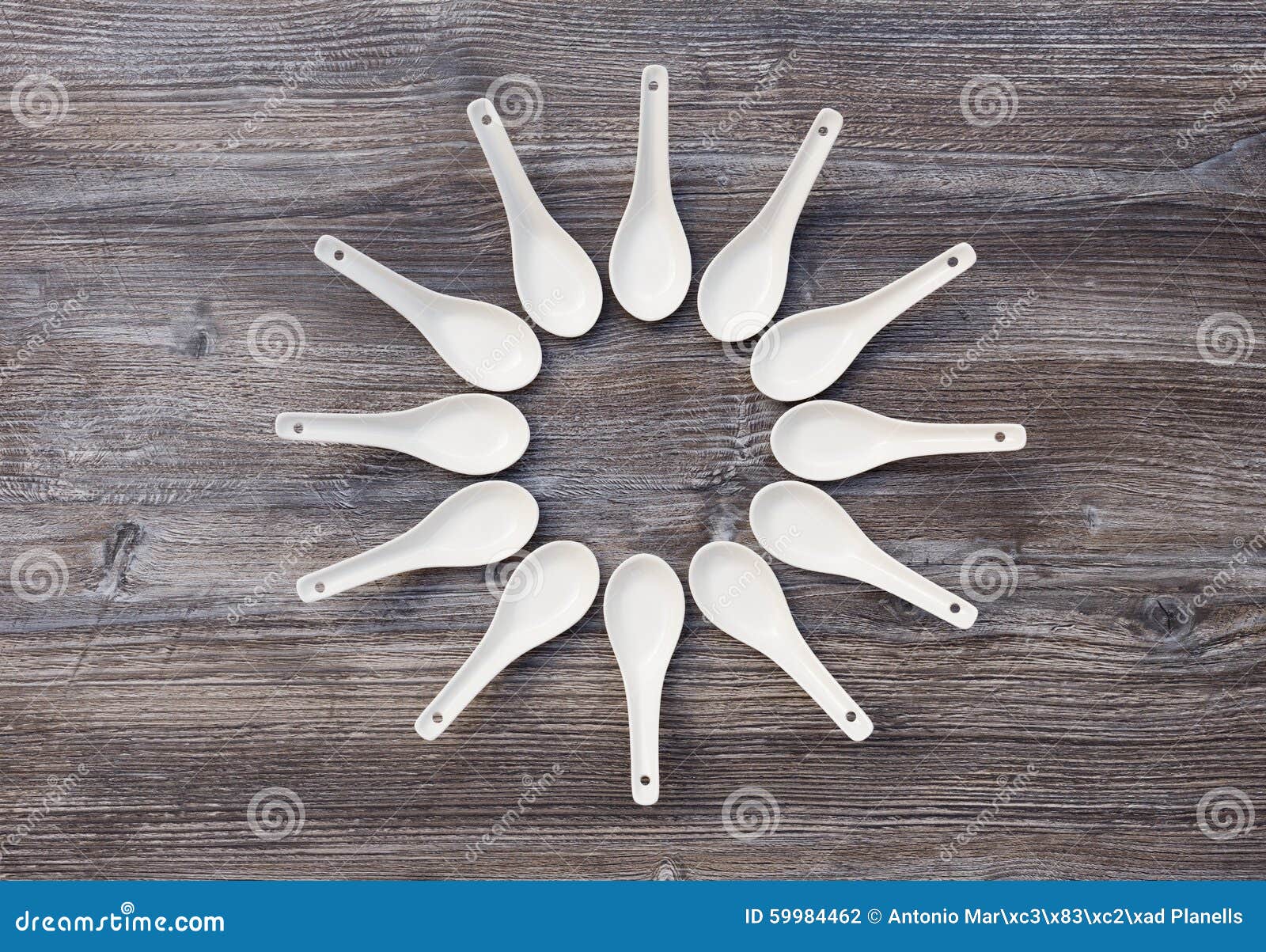 Twelve Spoons on Artificial Wooden Table Stock Photo - Image of spoon ...