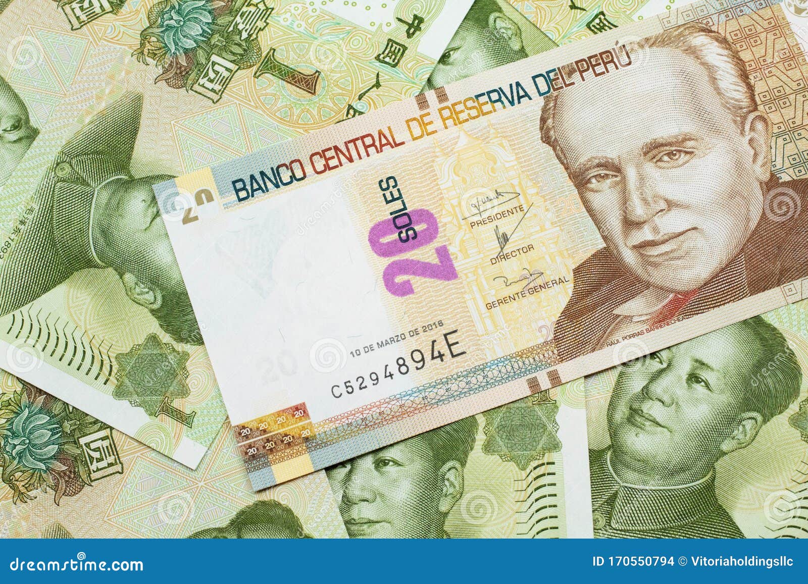 A Twenty Peruvian Sol Bank Note One a Bed of Chinese One Yuan Bank ...