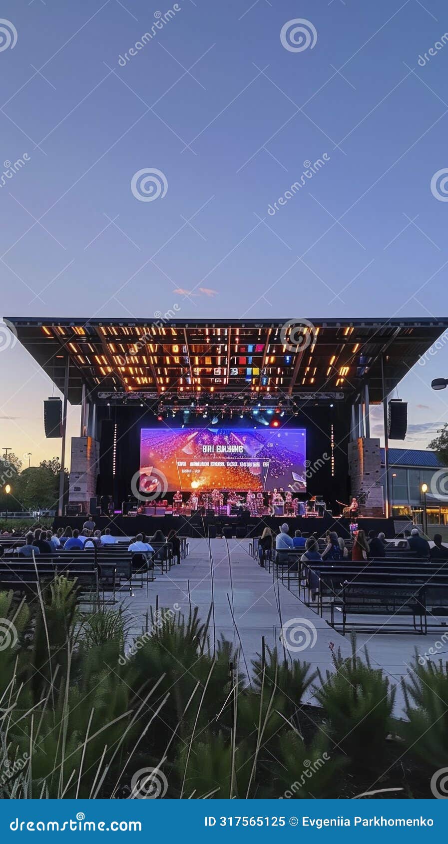 Twilight Concert at Outdoor Amphitheater with Sparse Audience Stock ...