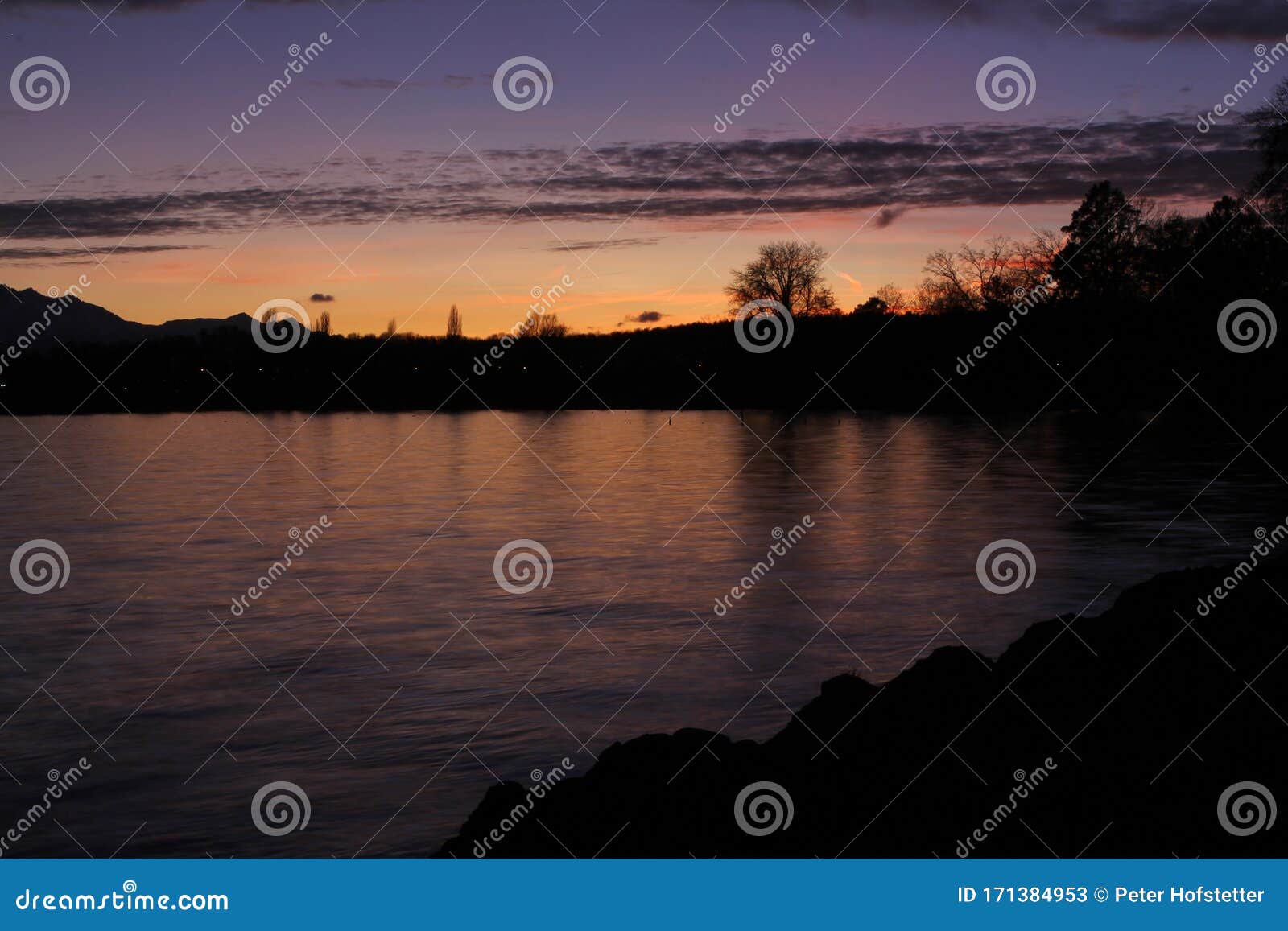 Twilight by the Lake in Cham, Zug with the Swiss Alps Stock Image ...