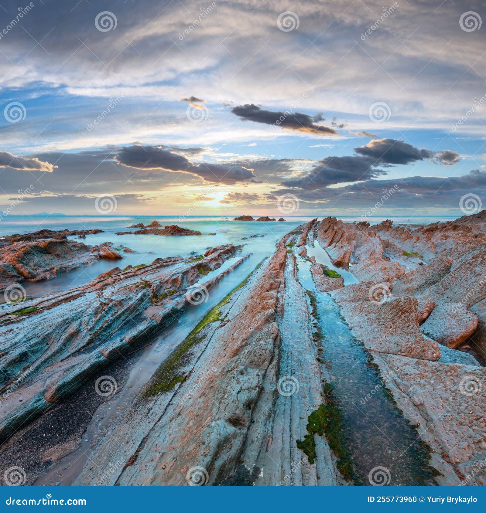 Twilight Ocean Coast with Ribbed Stratiform Rock Stock Photo - Image of ...
