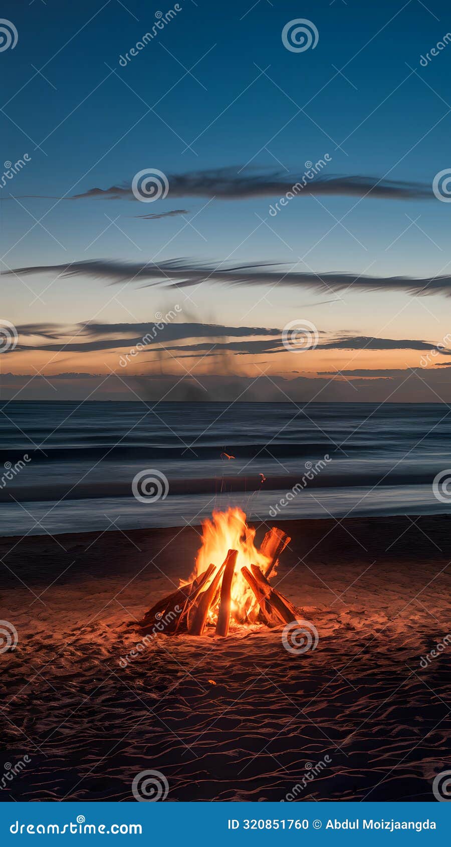 Twilight Transforms Beach into Serene Scene with Blazing Bonfire ...