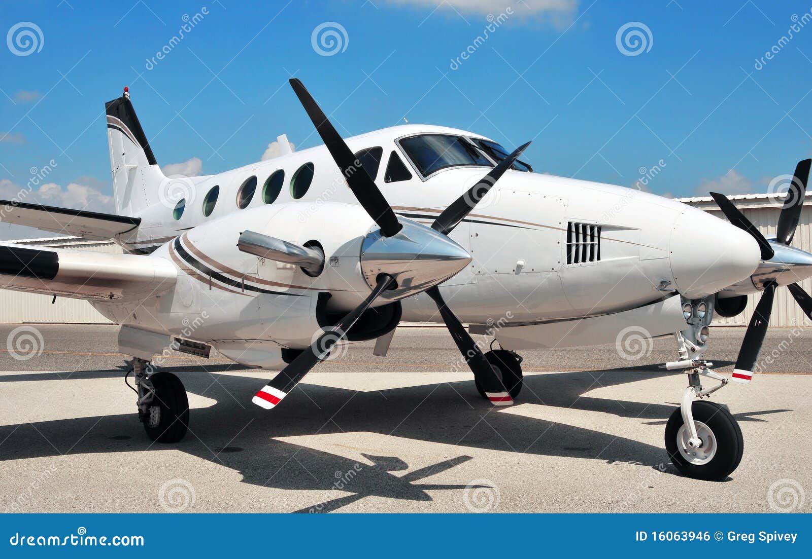 Twin Engine Plane on Tarmac Stock Photo - Image of runway, aviation ...