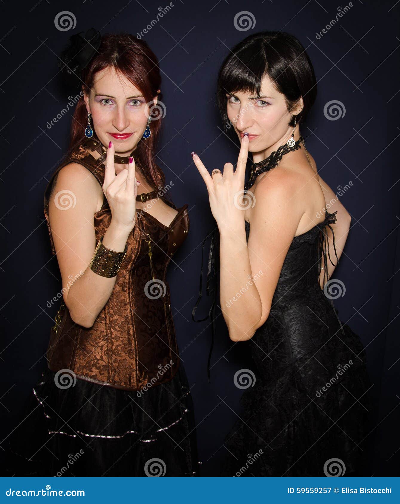 Twin metal sisters stock image. Image of portrait, hand - 59559257