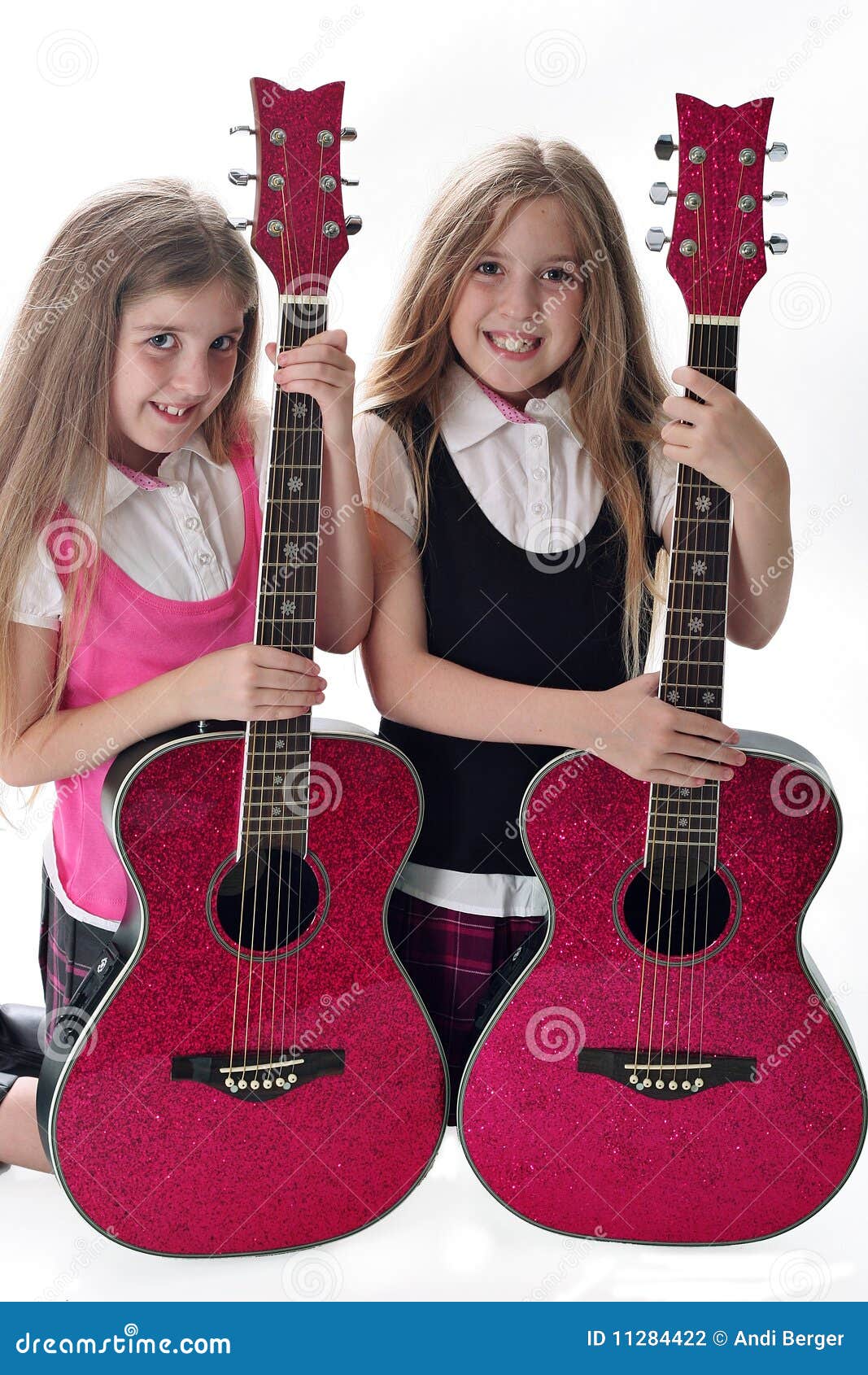 Twin sisters with guitars stock photo. Image of dress - 11284422