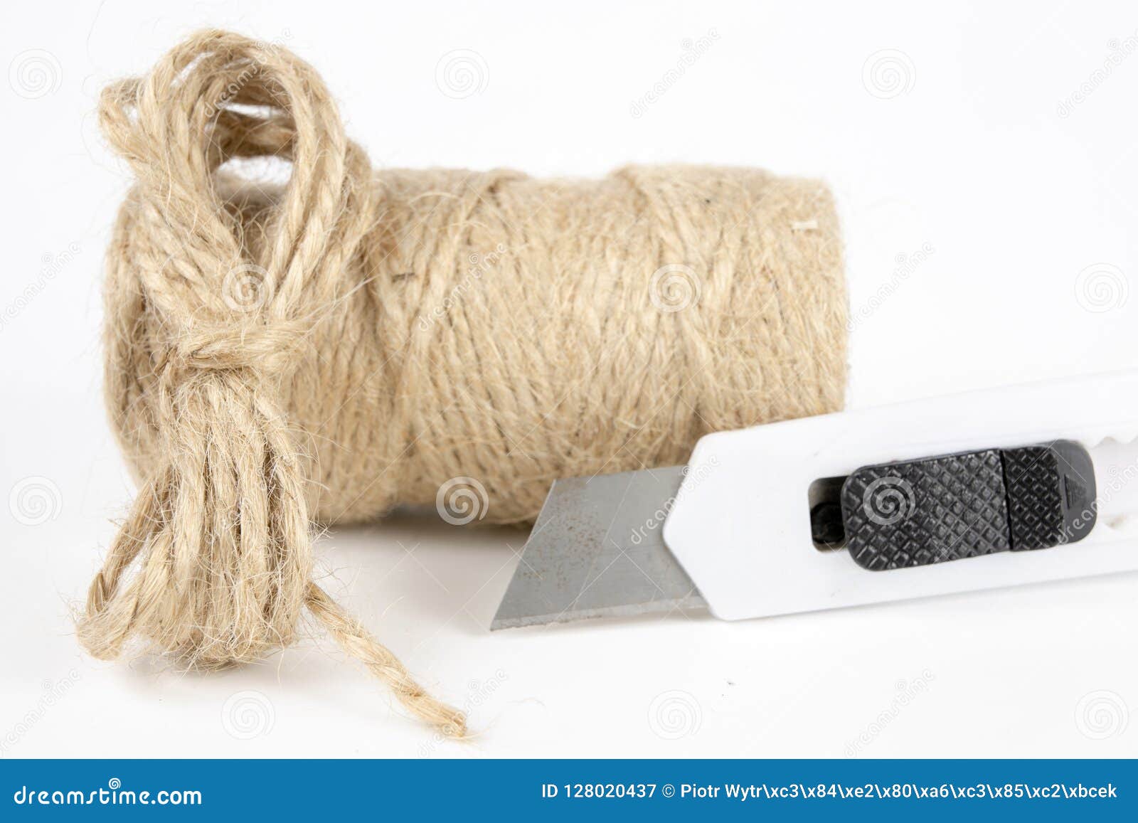 Twine for Packaging Parcels and a Sharp Knife. Cable for Binding Stock ...