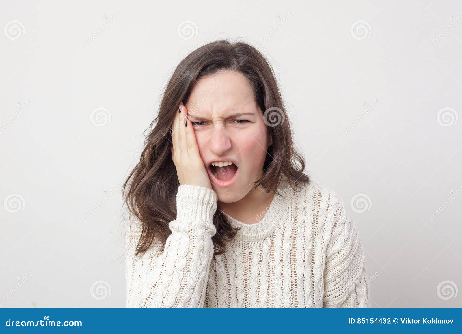 Twinge of toothache stock photo. Image of expression - 85154432
