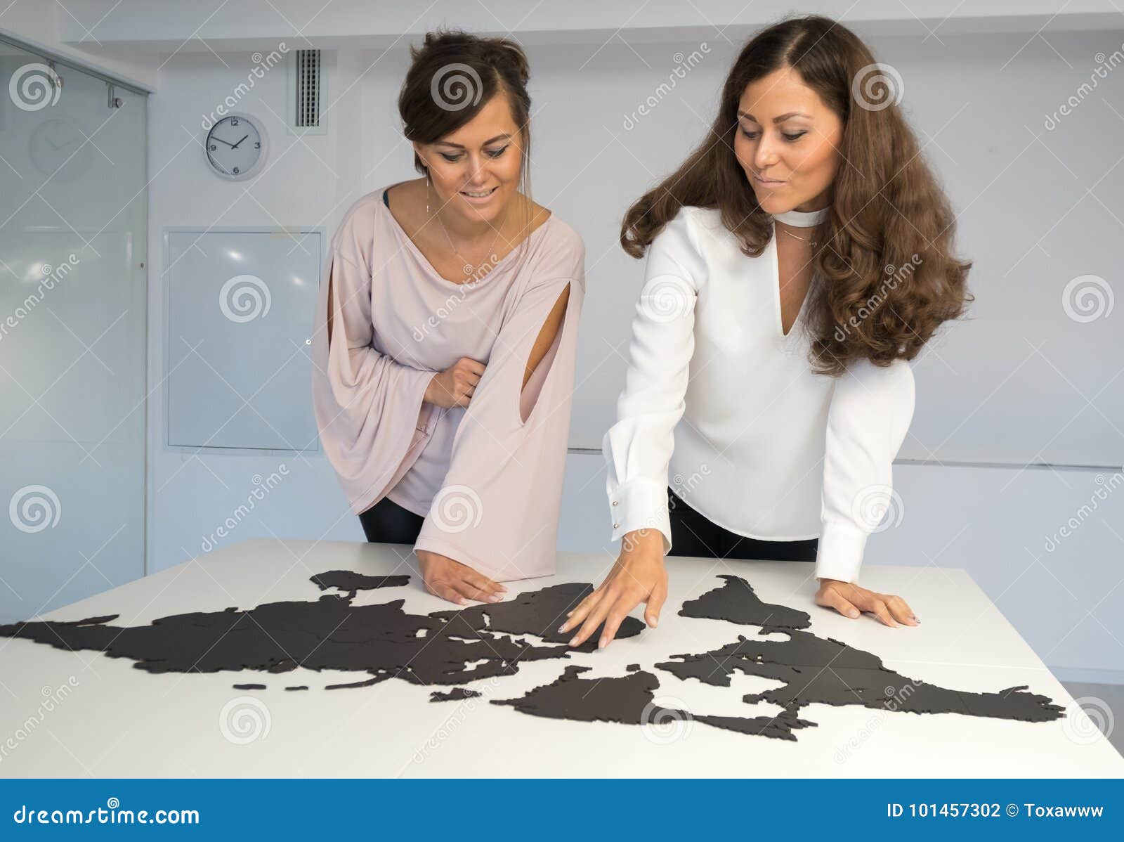 Twins Girls Fixing the World Map Stock Photo - Image of cargo ...