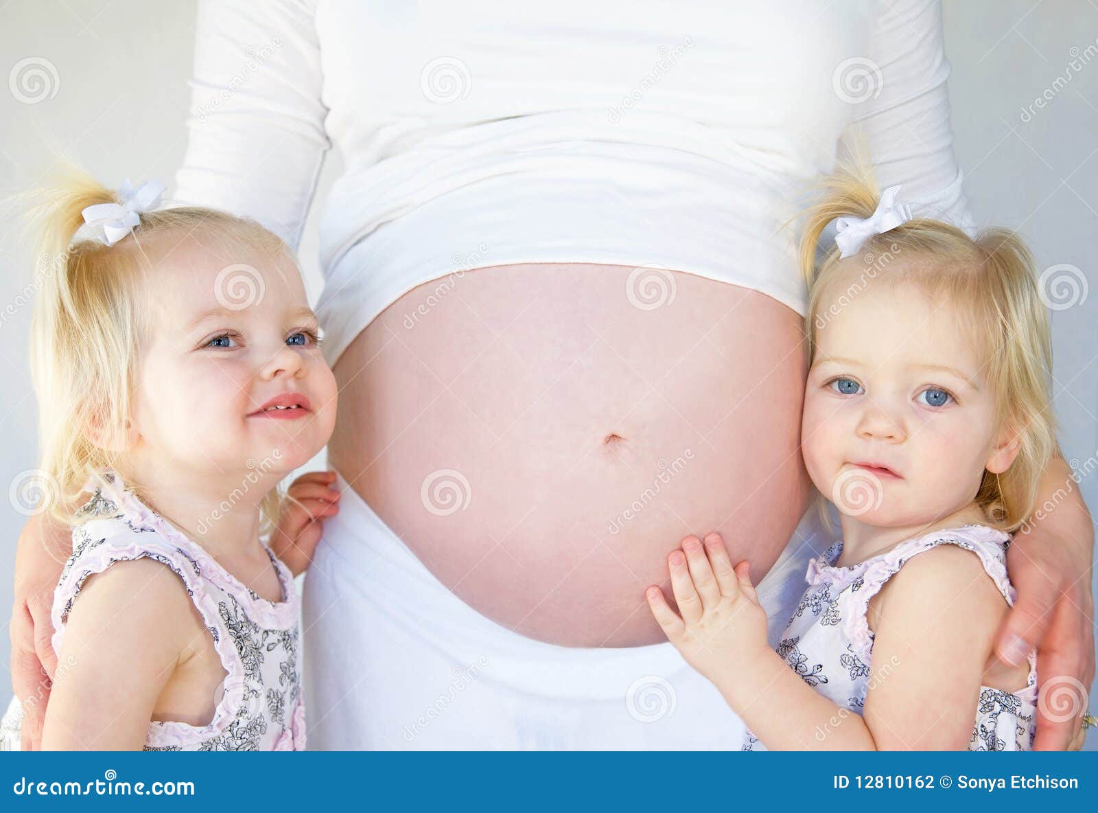 Twins with New Baby stock photo. Image of affection, childhood - 12810162