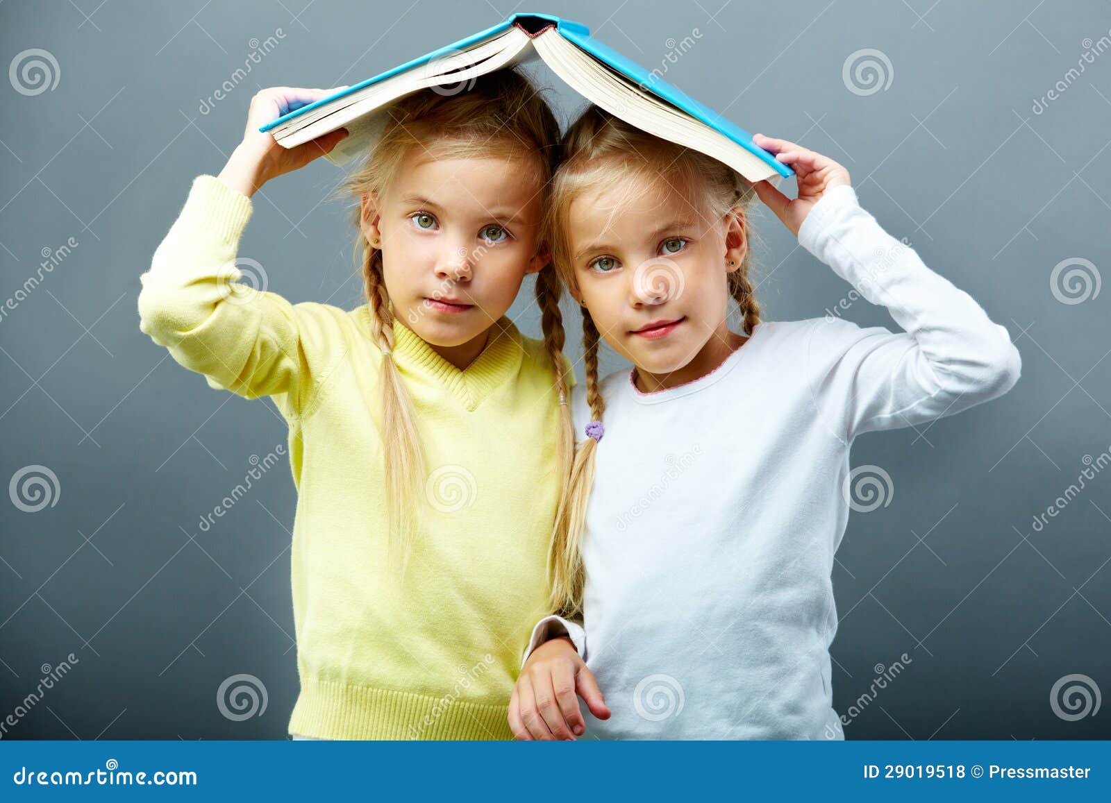 Twins under book stock photo. Image of lifestyle, literature - 29019518