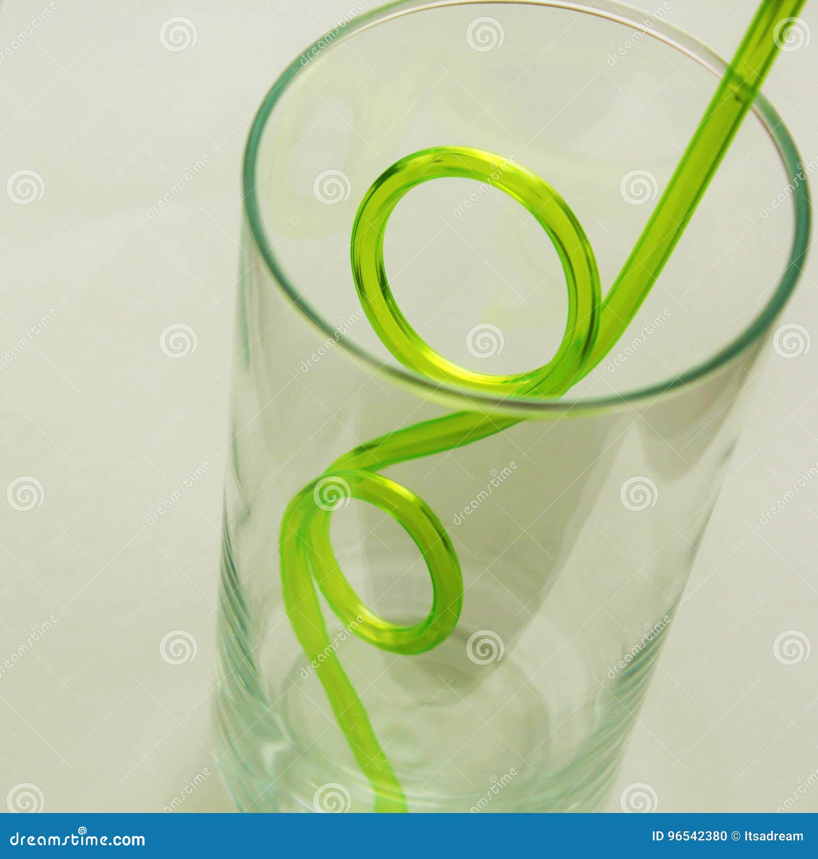 Twisted Green Straw in Clear Glass Stock Photo - Image of white ...