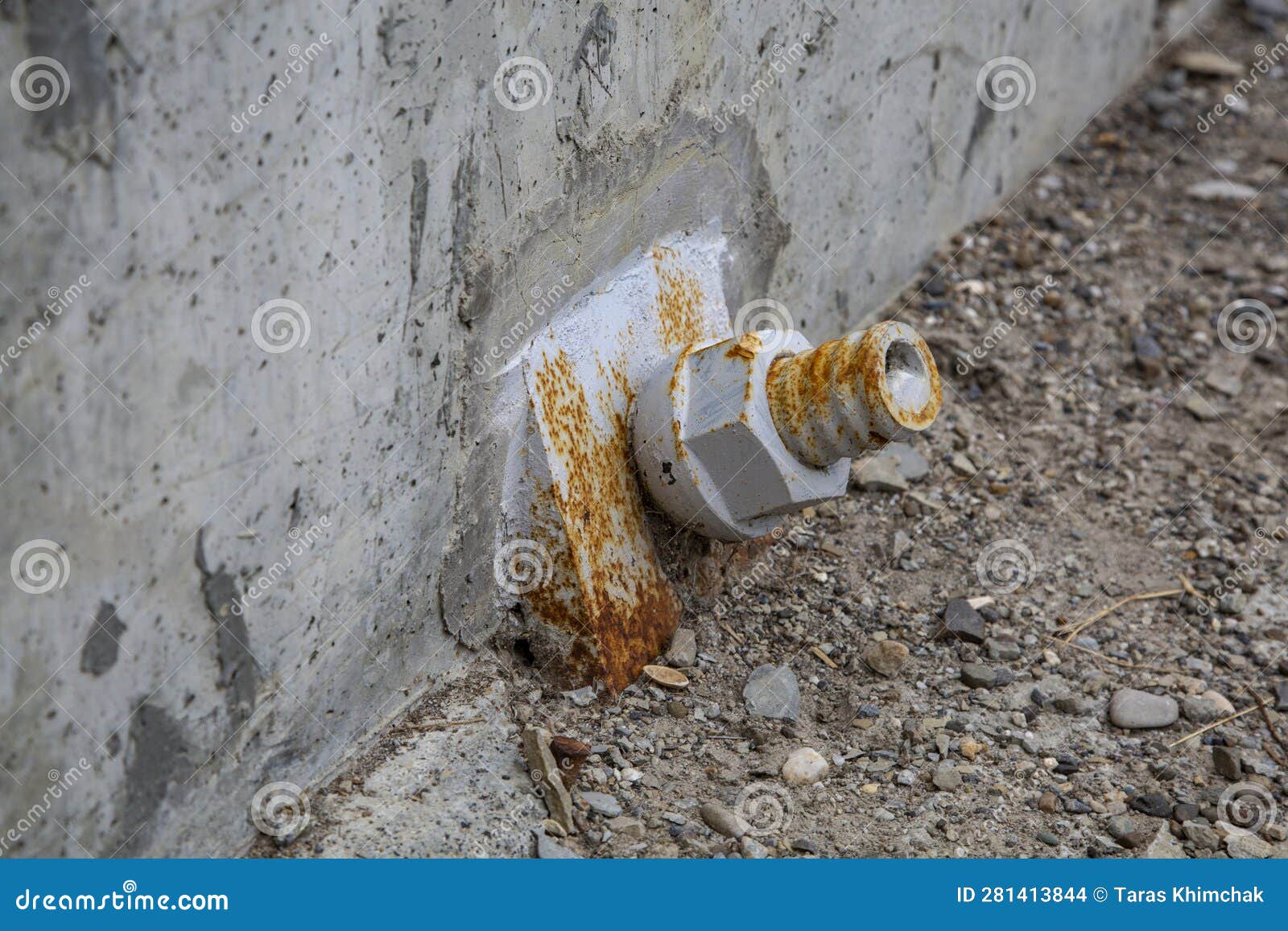 Twisted Metal Nut Covered with Rust on the Concrete Wall of the Bridge ...