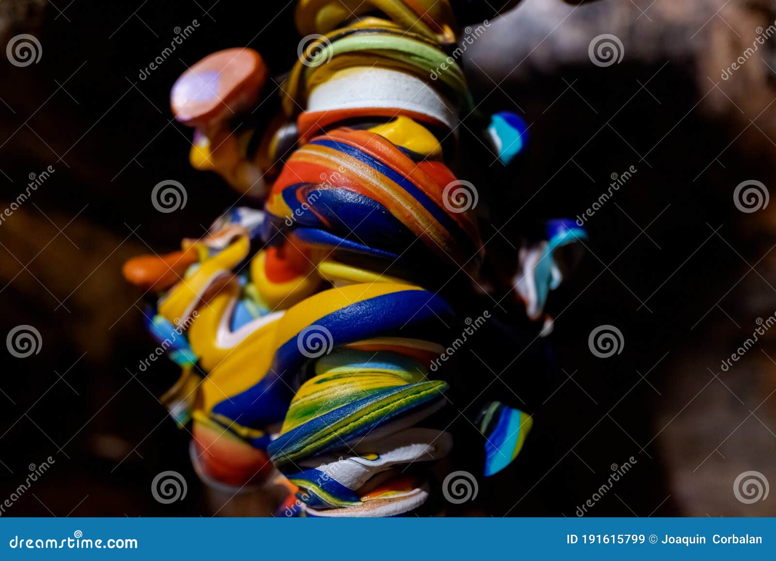 Twisted Plastic Material with Rounded Color Mix, Isolated on Black ...