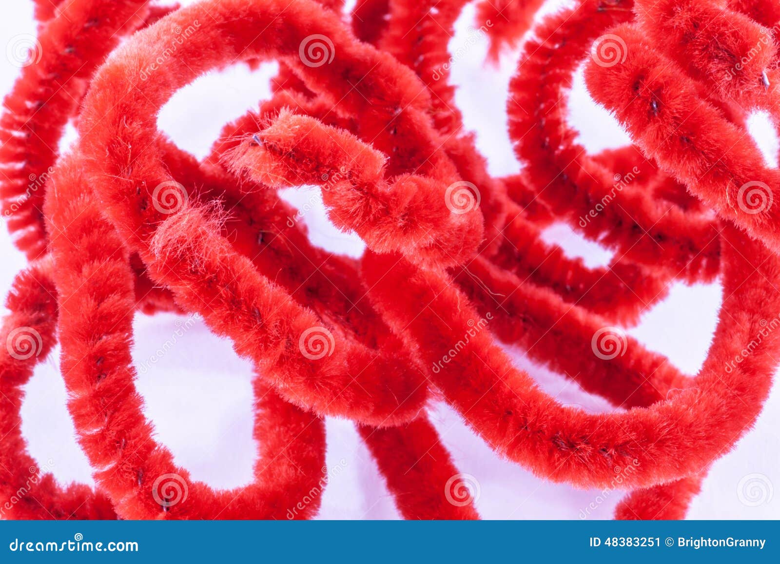 Twisted red pipe cleaners stock image. Image of details - 48383251