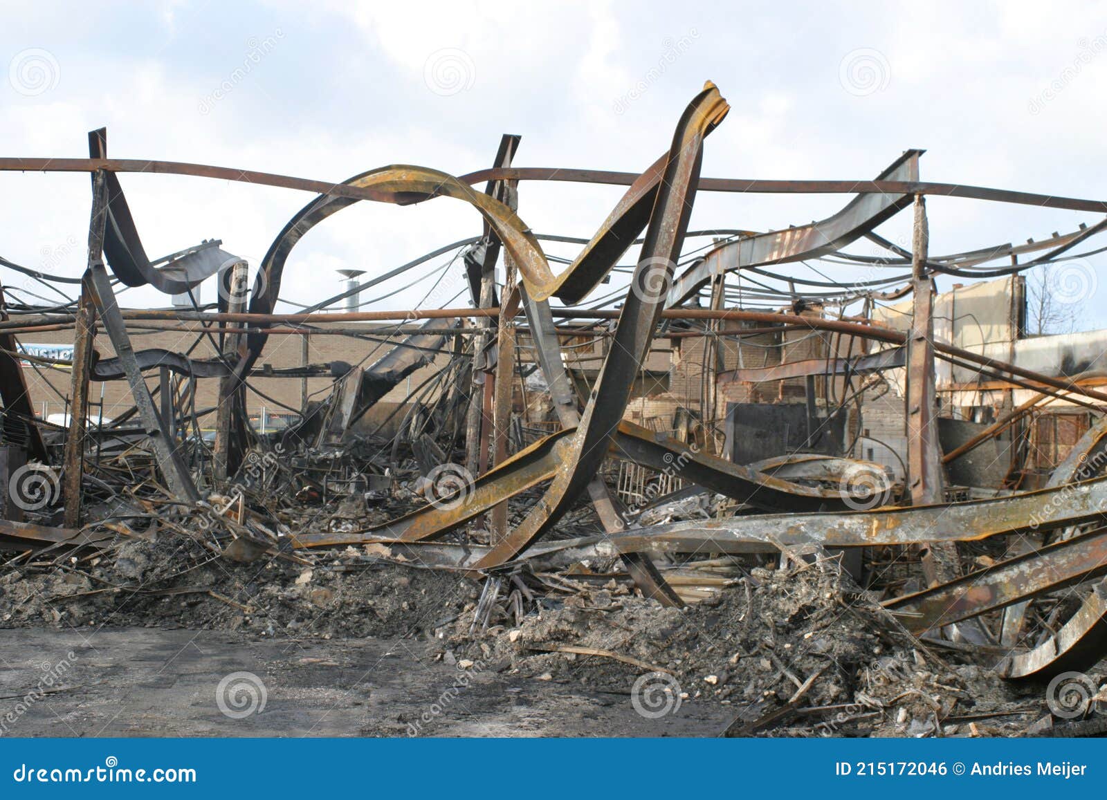 Twisted steel after a fire stock photo. Image of rust - 215172046