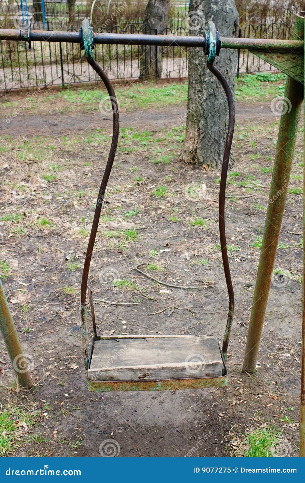 Twisted swings stock image. Image of street, kids, wooden - 9077275