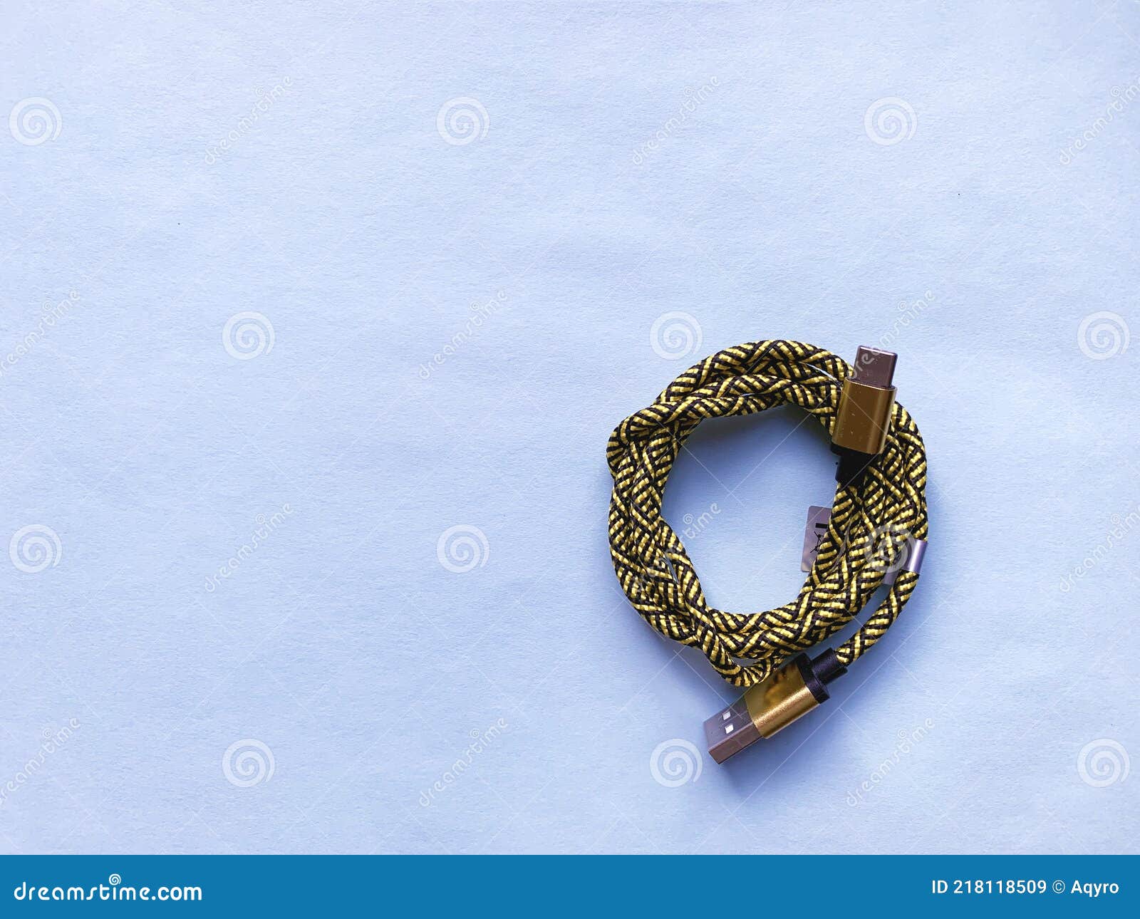 Twisted yellow USB cable stock image. Image of save - 218118509
